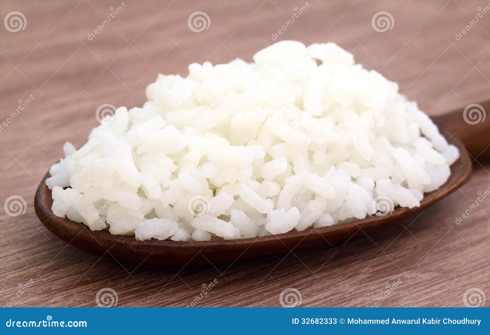 Cooked Rice on a Wooden Spoon Stock Image - Image of rice, meal: 32682333