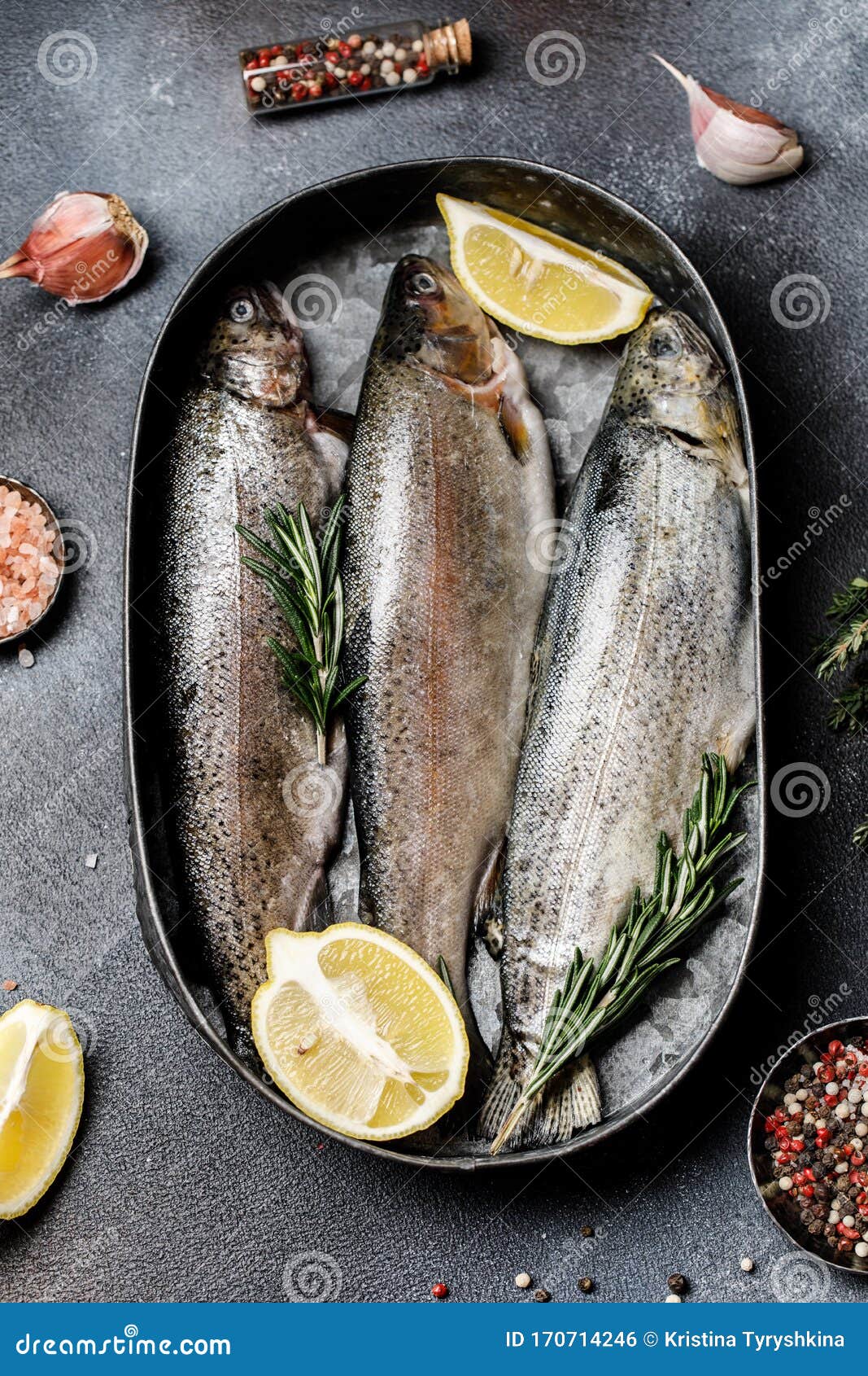 Cooked River Trout with Spices and Ingredient for Cooking on Rustic ...