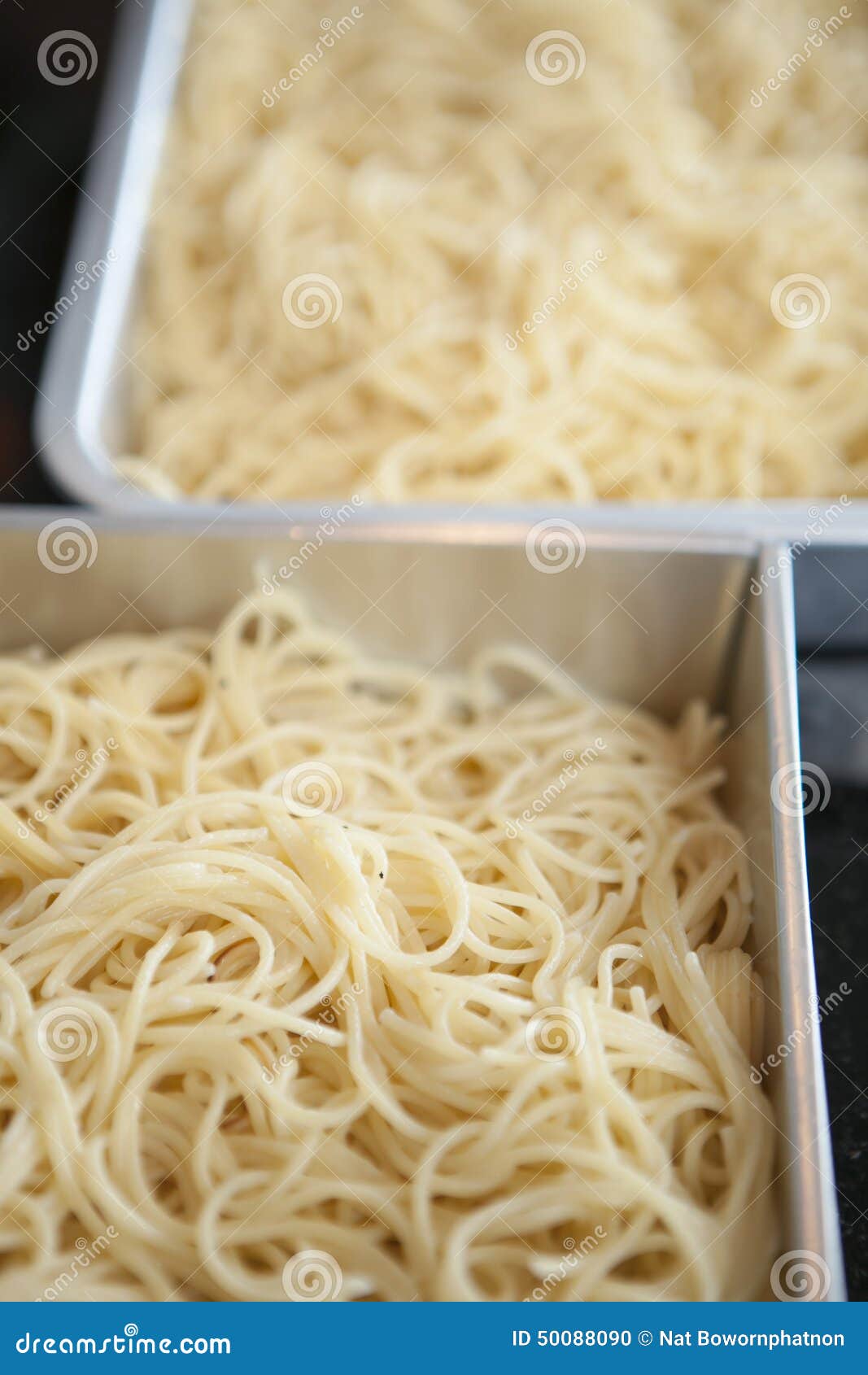Cooked spaghetti on tray stock photo. Image of dish, yellow - 50088090