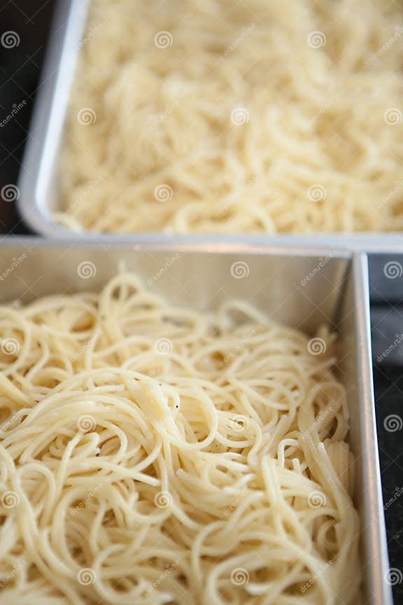 Cooked spaghetti on tray stock photo. Image of dish, yellow - 50088090