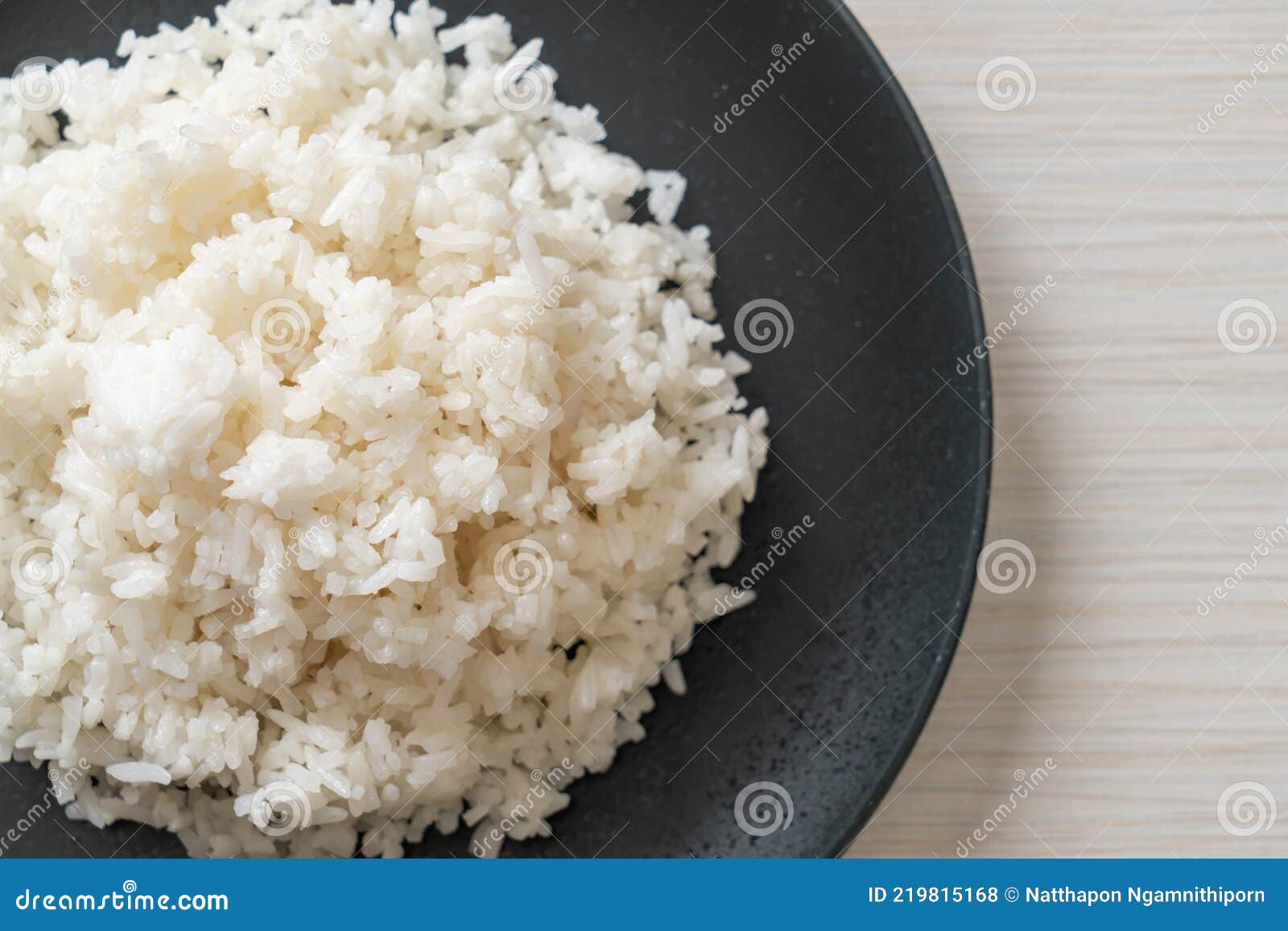 Cooked rice on plate stock photo. Image of ingredient - 219815168