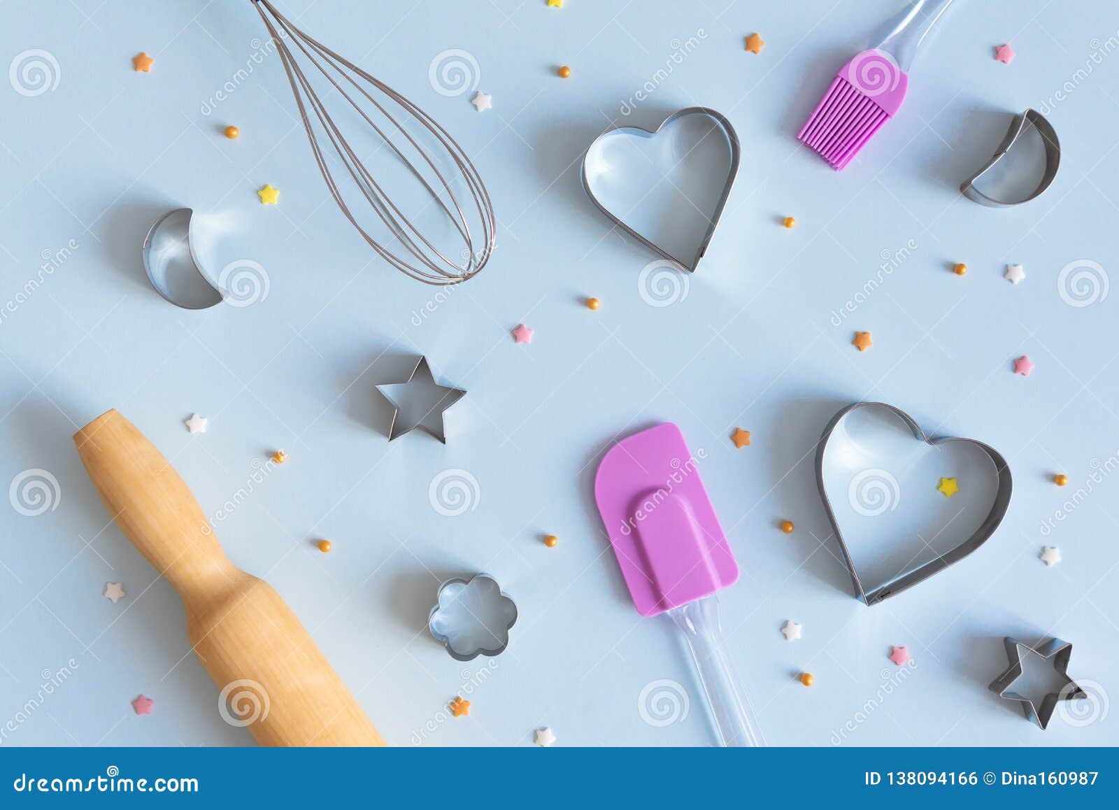 Cookie Cutters, Whisk and Rolling Pin on Blue Background. Bakery and ...