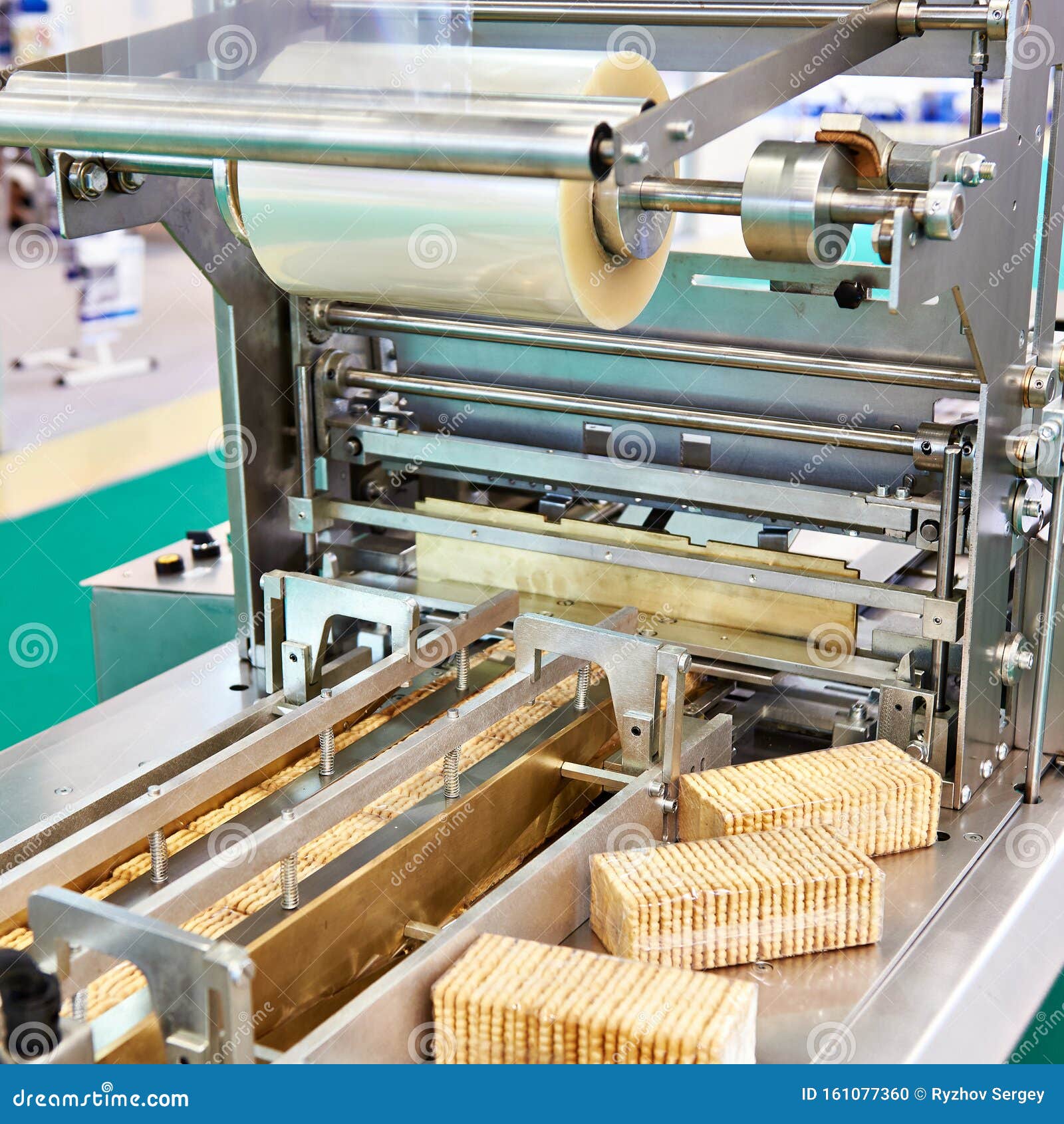 Cookie wrapping machine stock photo. Image of bakery - 161077360