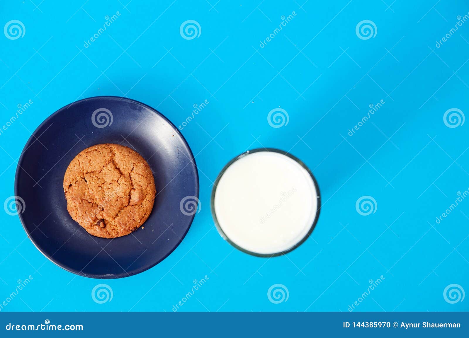 Cookies on Blue Background. Oatmeal Cookie with Pieces of Chocolate ...