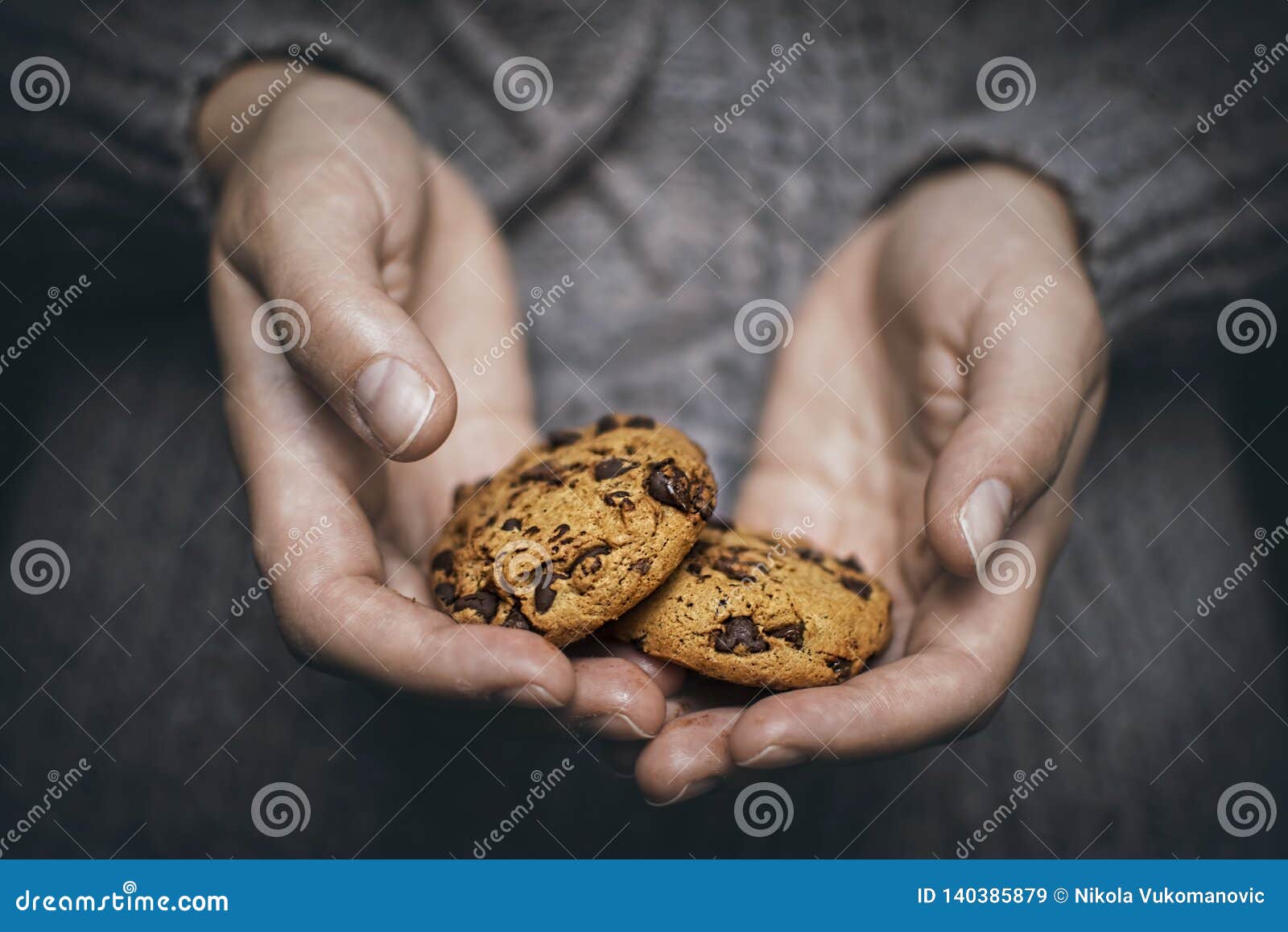 Cookies in hands stock image. Image of bakery, fresh - 140385879