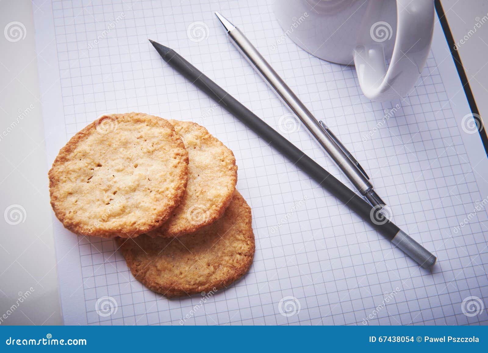 Cookies on Notepad in Office. Snack Time in a Work. Pencil and Pen As ...