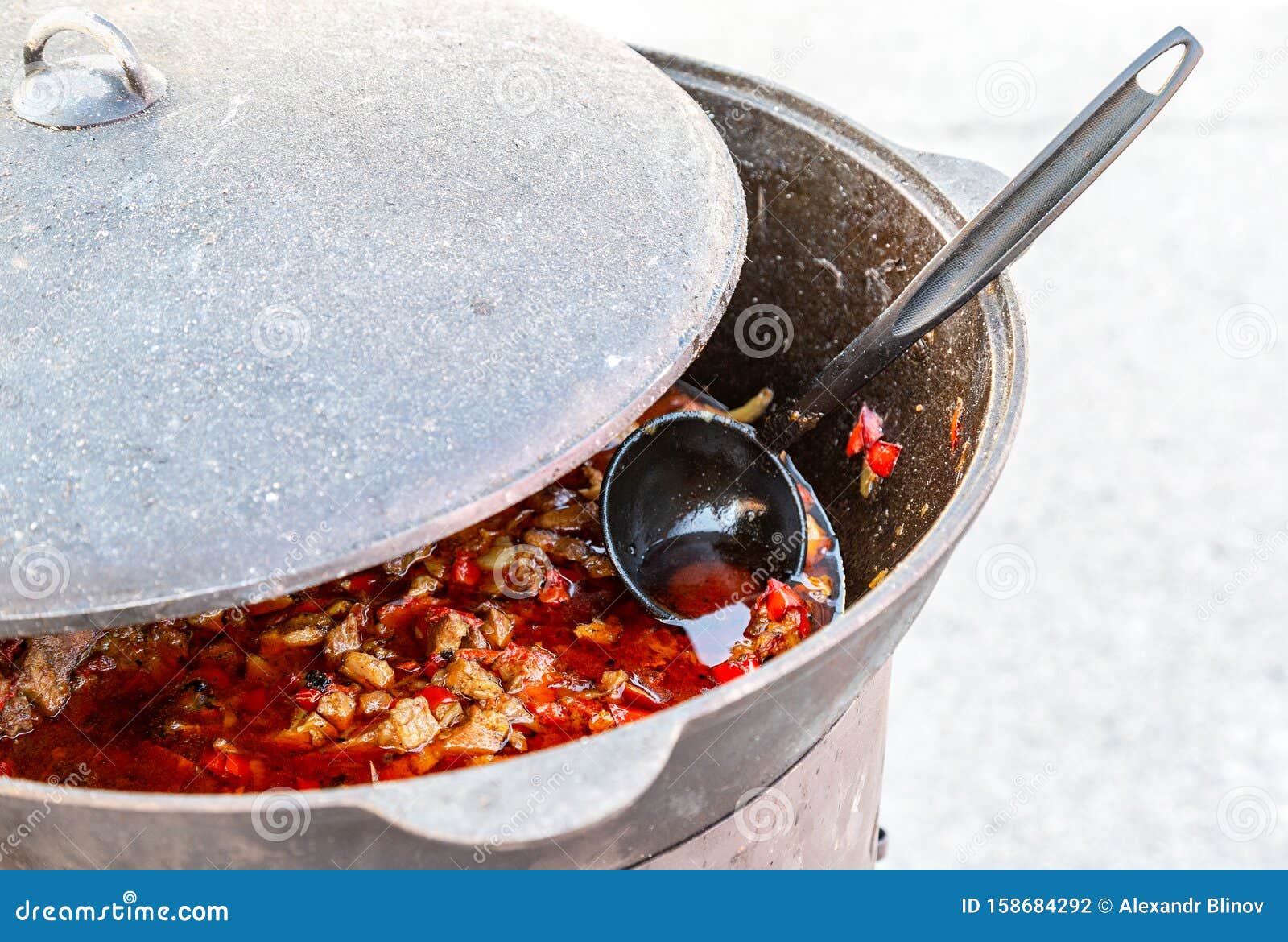 Cooking Appetizing Soup with Meat in a Cauldron Stock Photo - Image of ...