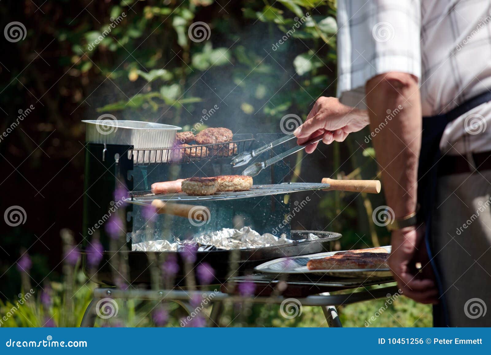 Cooking on a Barbecue stock photo. Image of easy, burn - 10451256