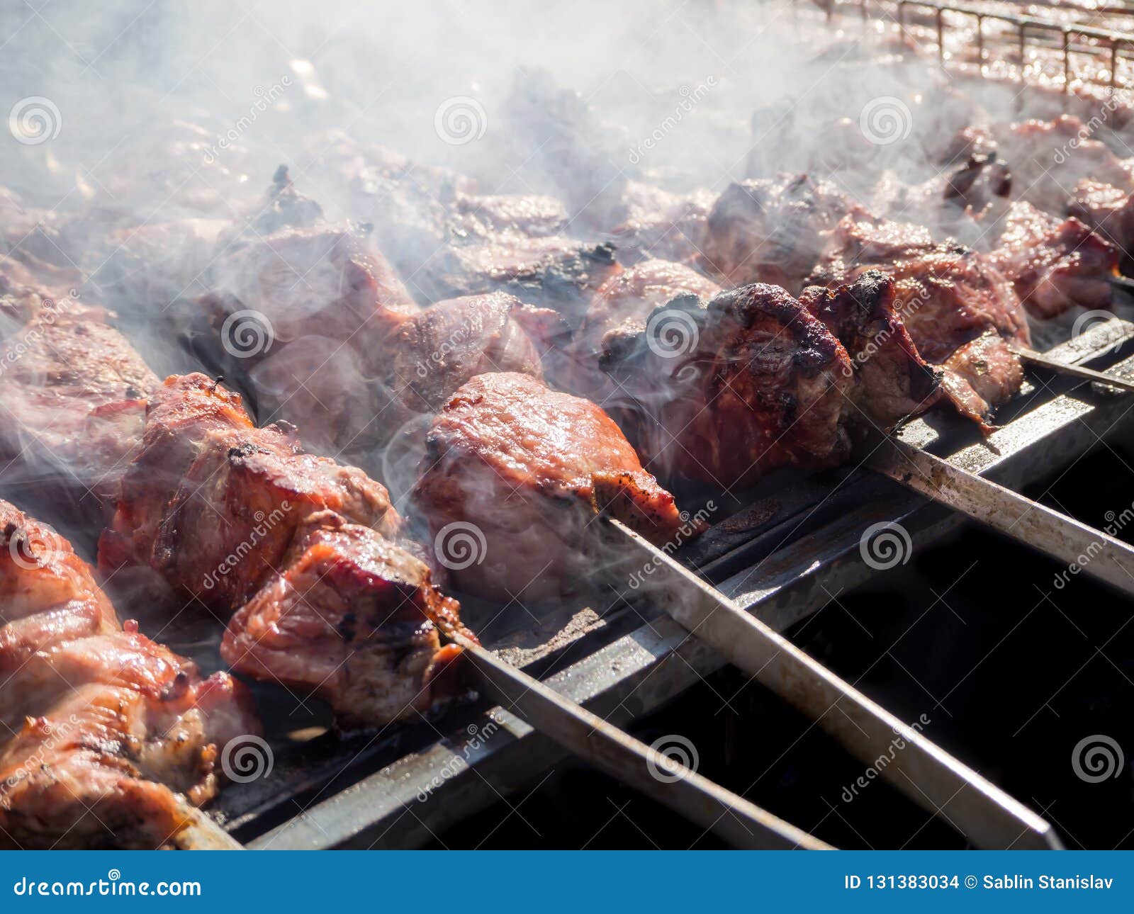 Cooking BBQ Meat. Picnic in Nature with Cooking Meat. Stock Photo ...