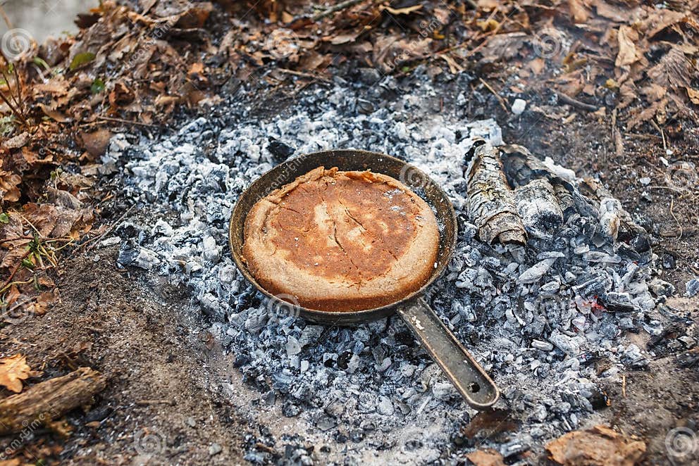 Cooking Bread on Fire Coals in the Evening Stock Photo - Image of flame ...