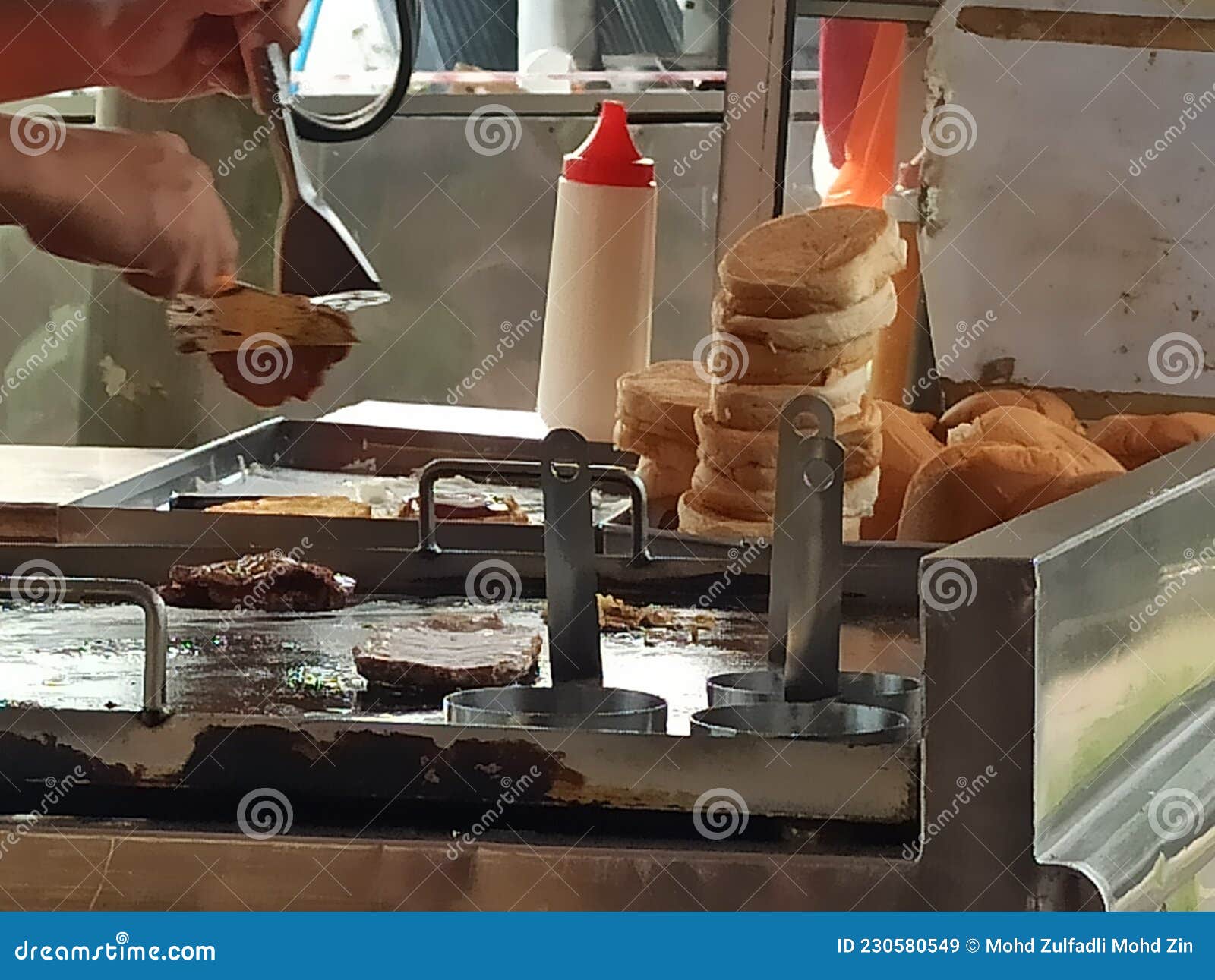Cooking burger at stall stock image. Image of meal, dessert - 230580549
