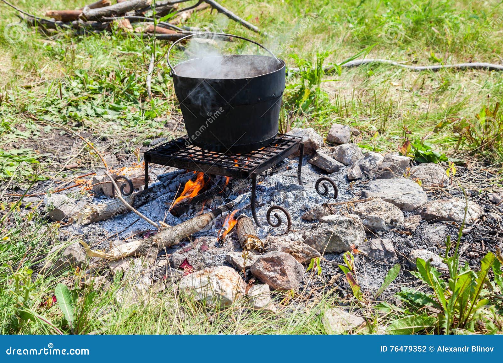 Cooking on a Camp Fire Outdoors in Sunny Day Stock Photo - Image of ...