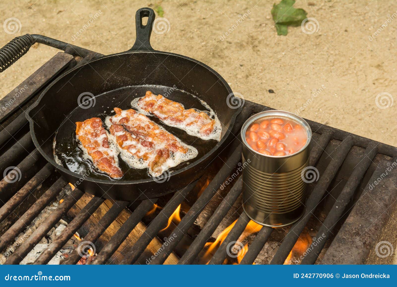 Cooking Campfire Beans with Bacon Stock Photo - Image of campsite ...