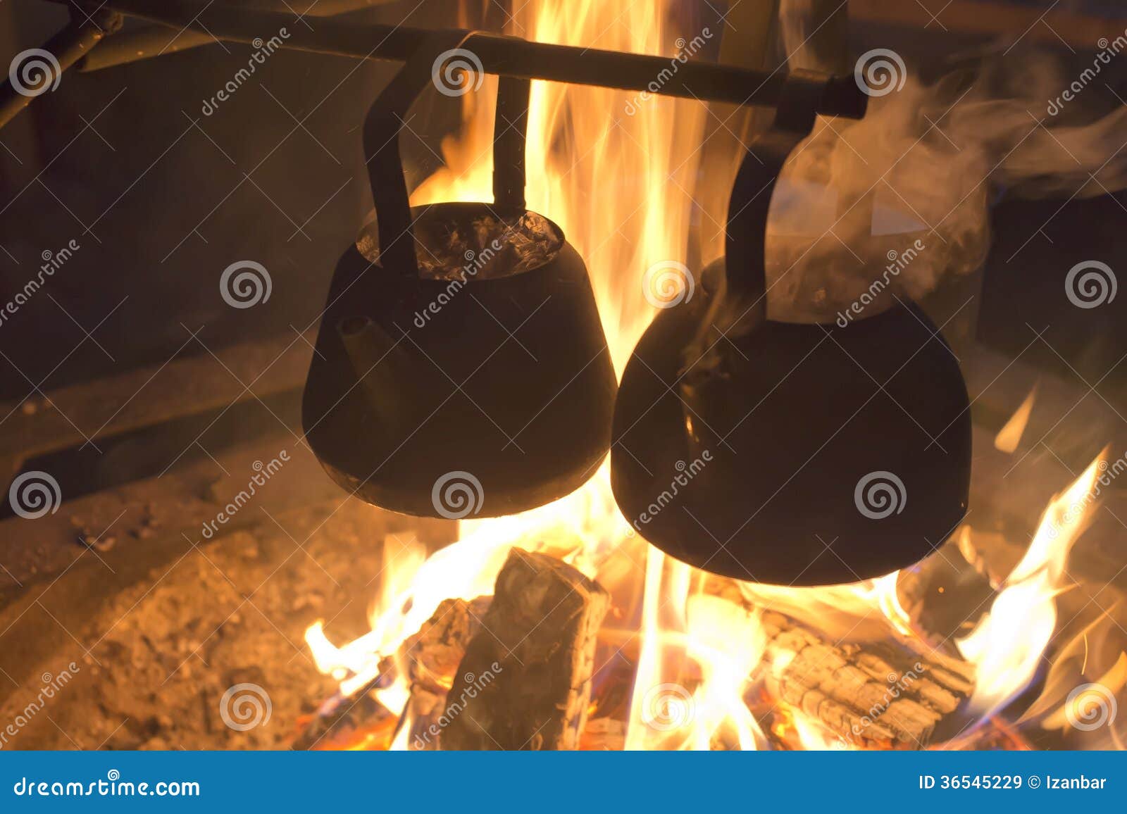 Cooking on the campfire stock image. Image of forest - 36545229