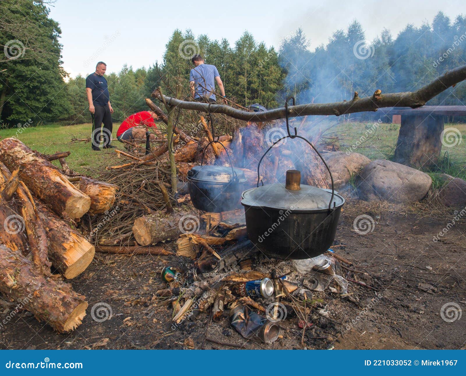 Cooking on campfire editorial photography. Image of ignite - 221033052