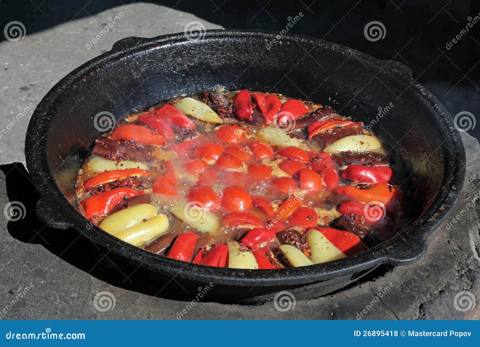 Cooking in a cauldron stock photo. Image of boil, open - 26895418