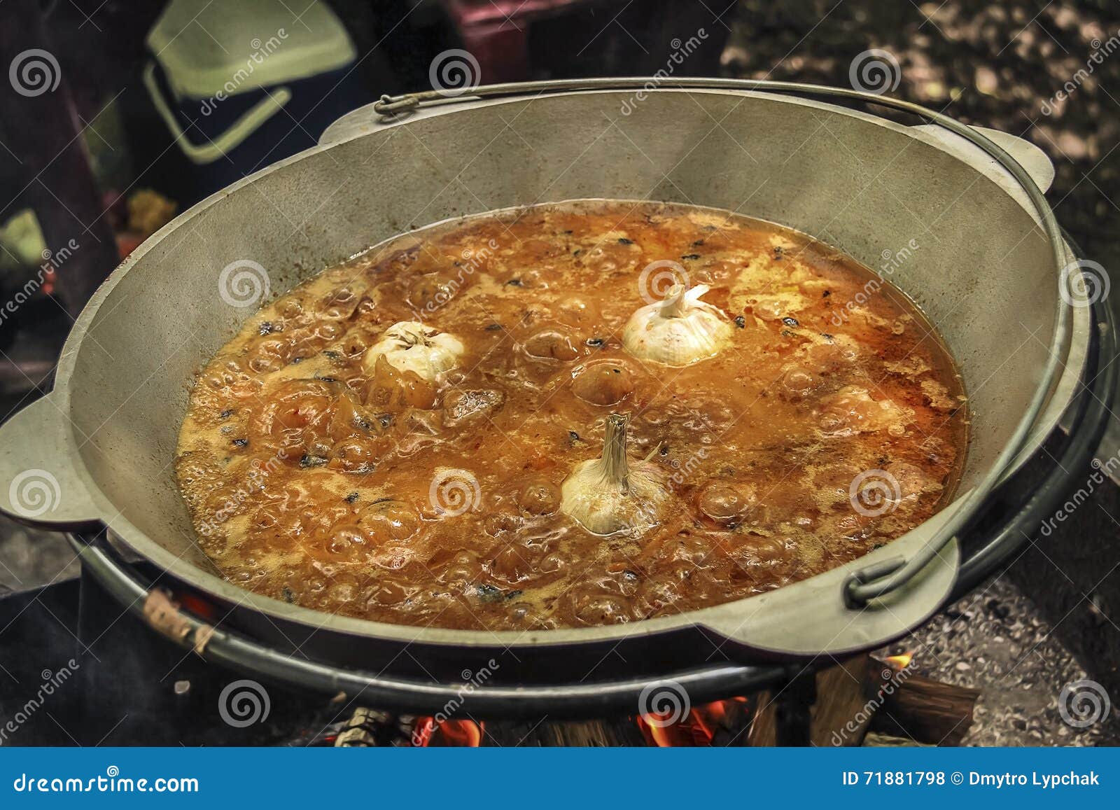 Cooking in a cauldron stock photo. Image of fresh, delicious - 71881798
