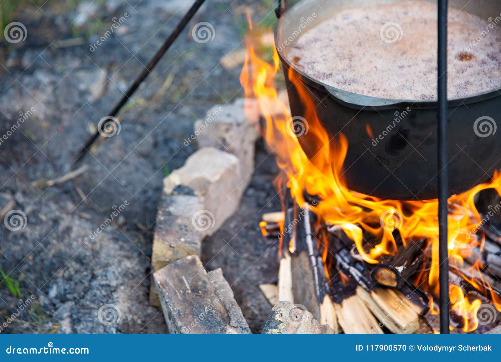 Cooking in a Cauldron at the Stake Stock Photo - Image of black ...