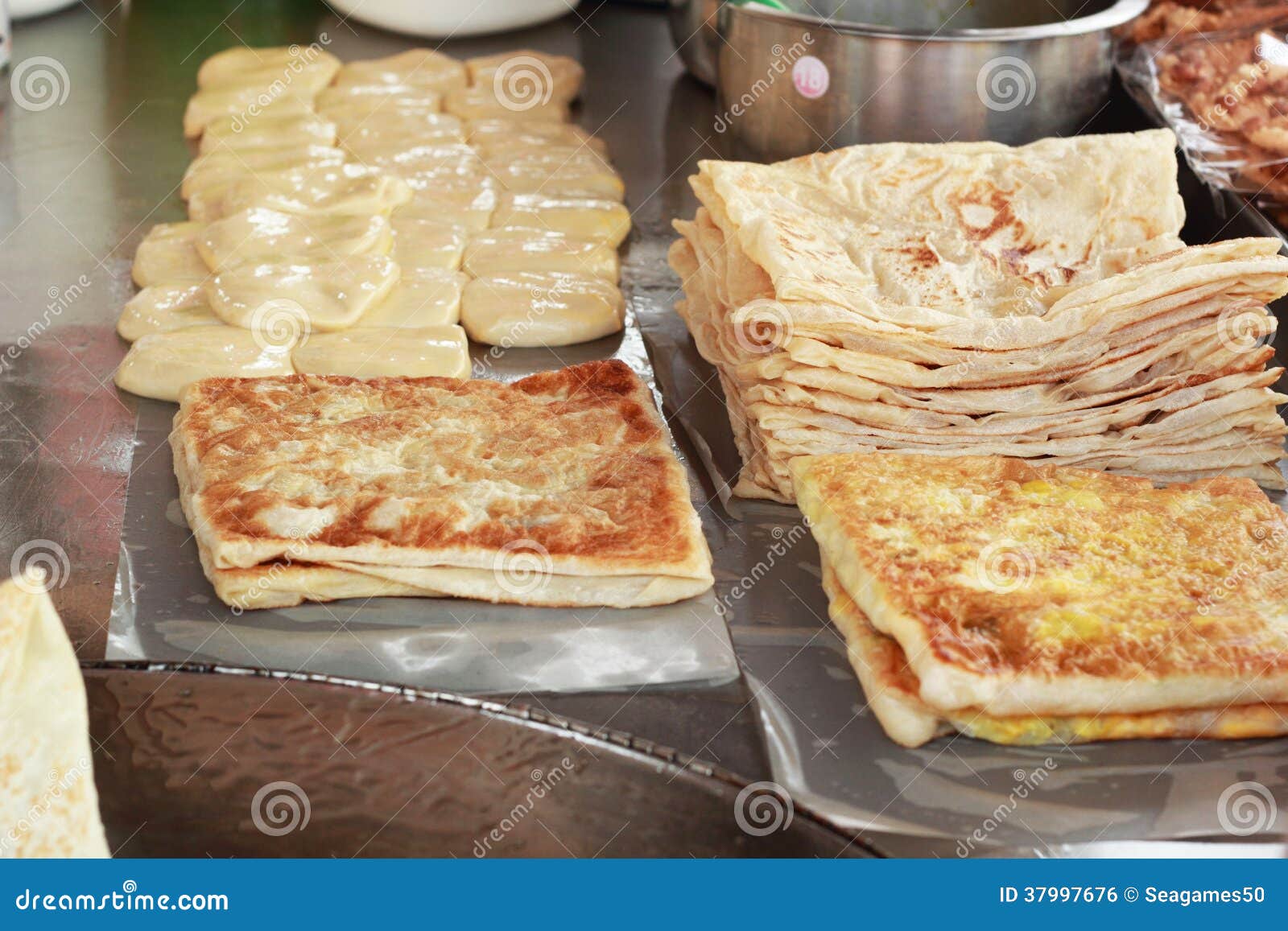 Cooking chapati on the pan stock photo. Image of fresh - 37997676