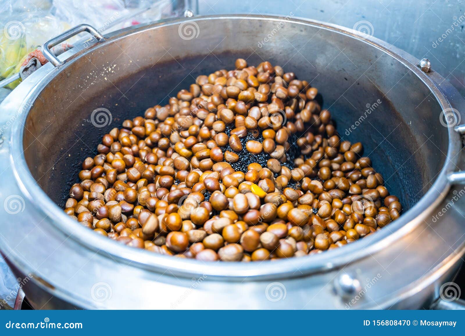 Cooking Chestnuts in Chestnut Roasting Machine Stock Photo - Image of ...