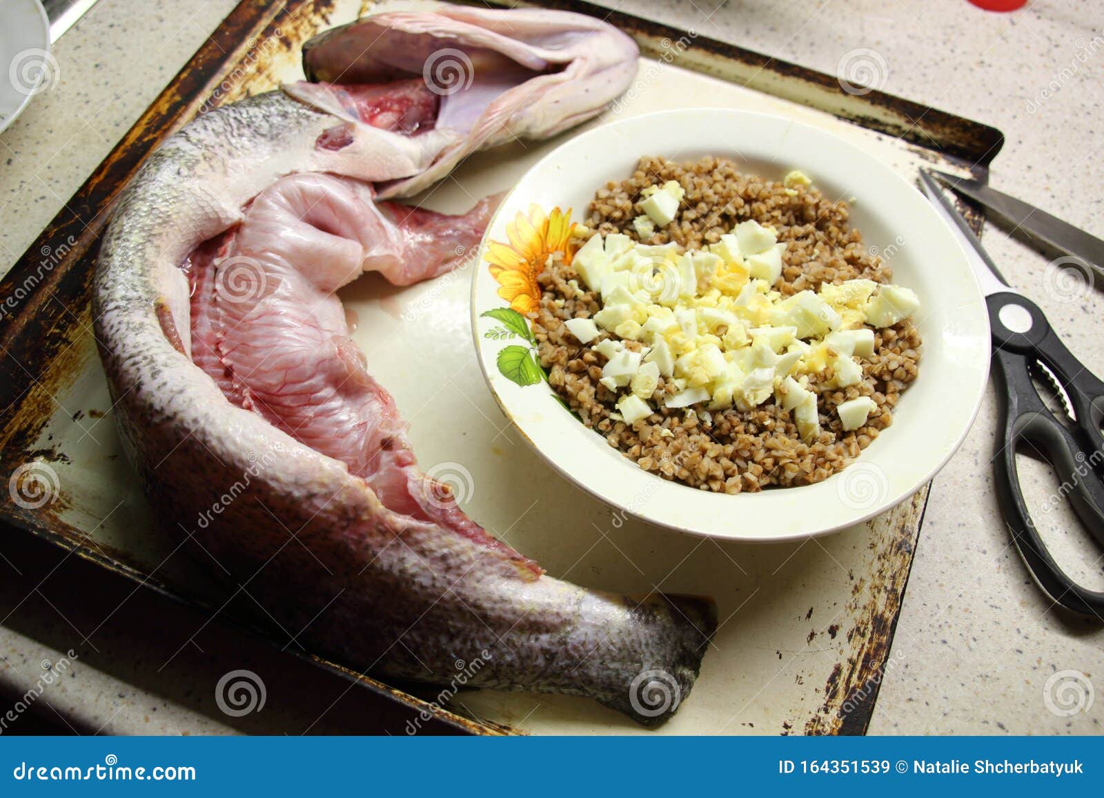 Cooking Chopped Up Fish Luce on Oven-tray with Egg and Buckwheat ...