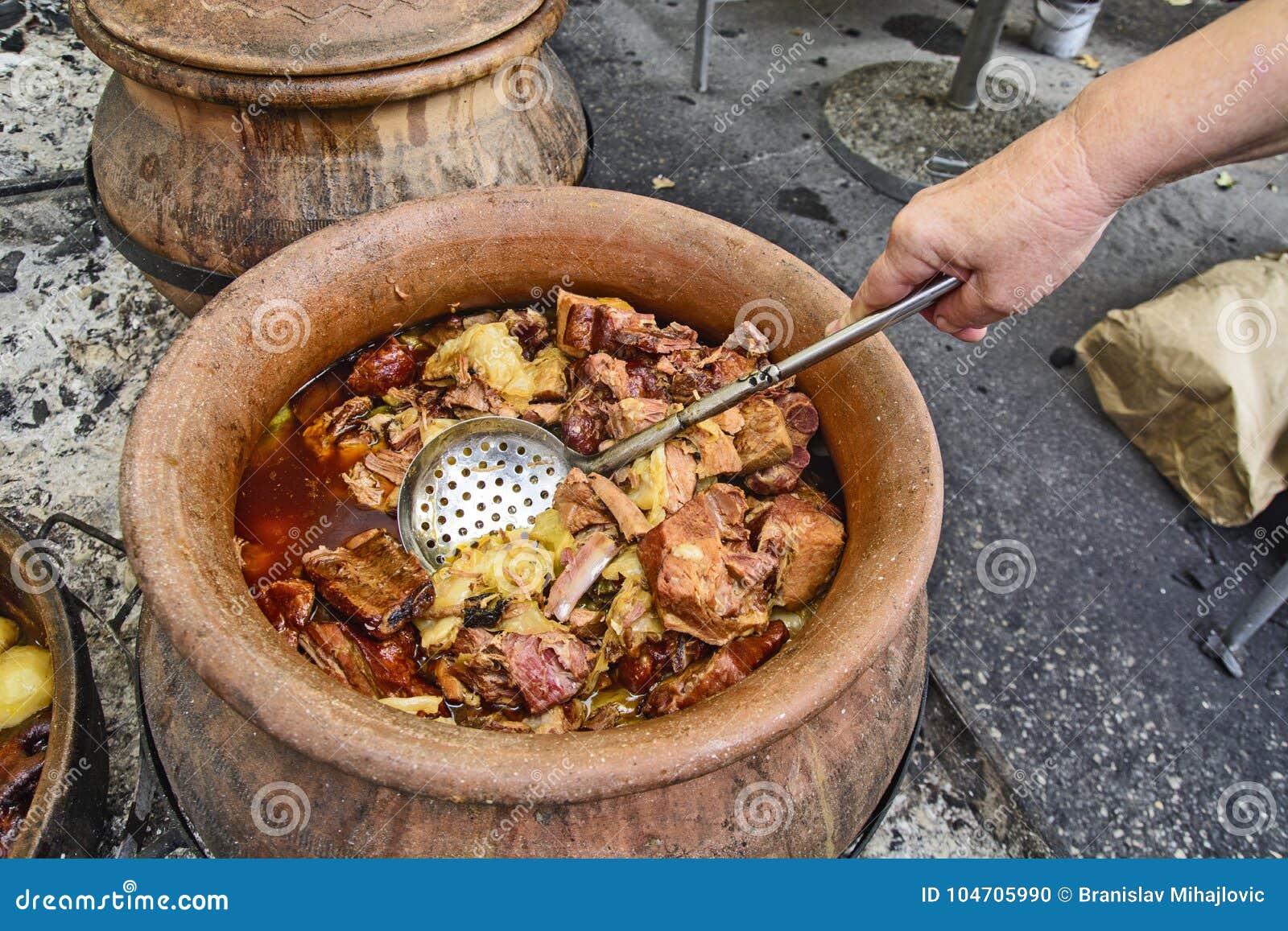 Cooking in a clay pot stock photo. Image of culture - 104705990