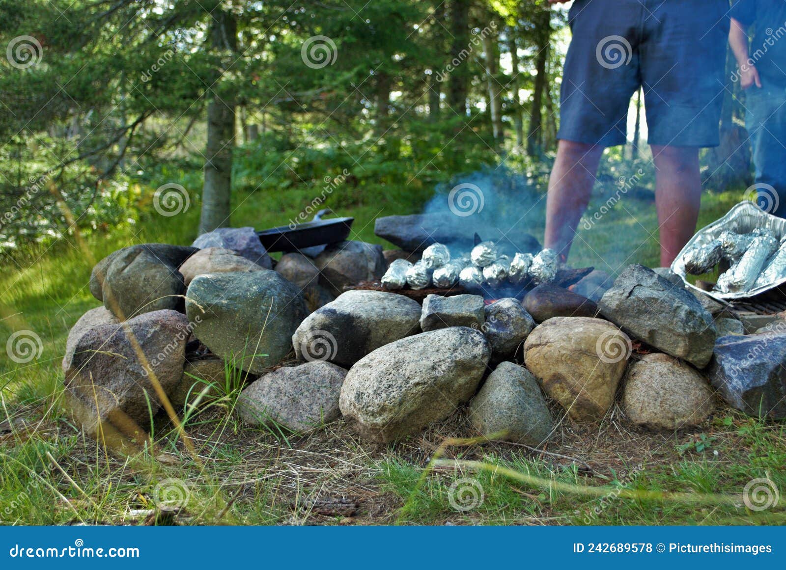 Cooking Corn on the Cob Over a Camp Fire Stock Photo - Image of ...