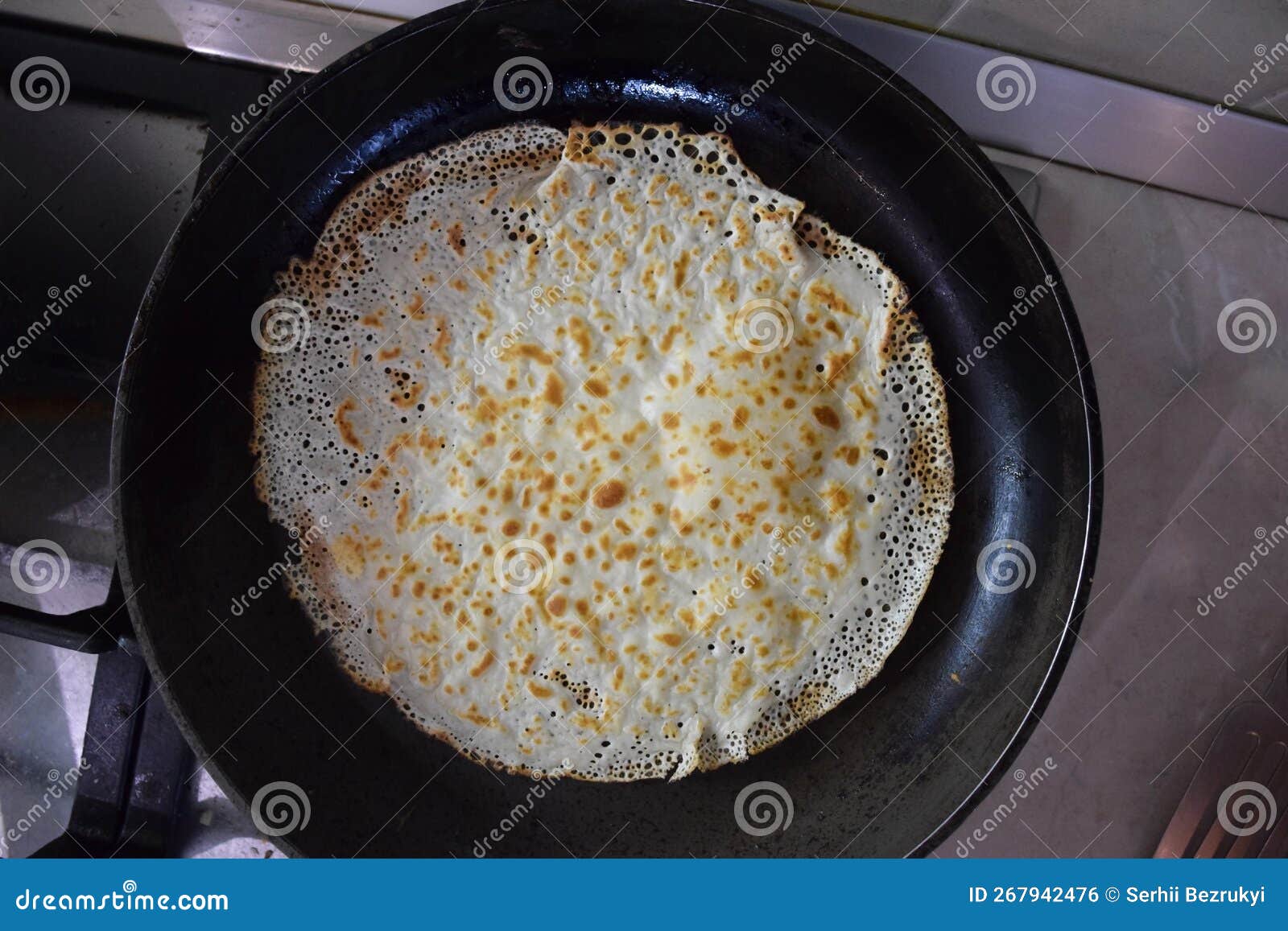Cooking a Delicious Fried Pancake in a Pan. View from Above Stock Photo ...