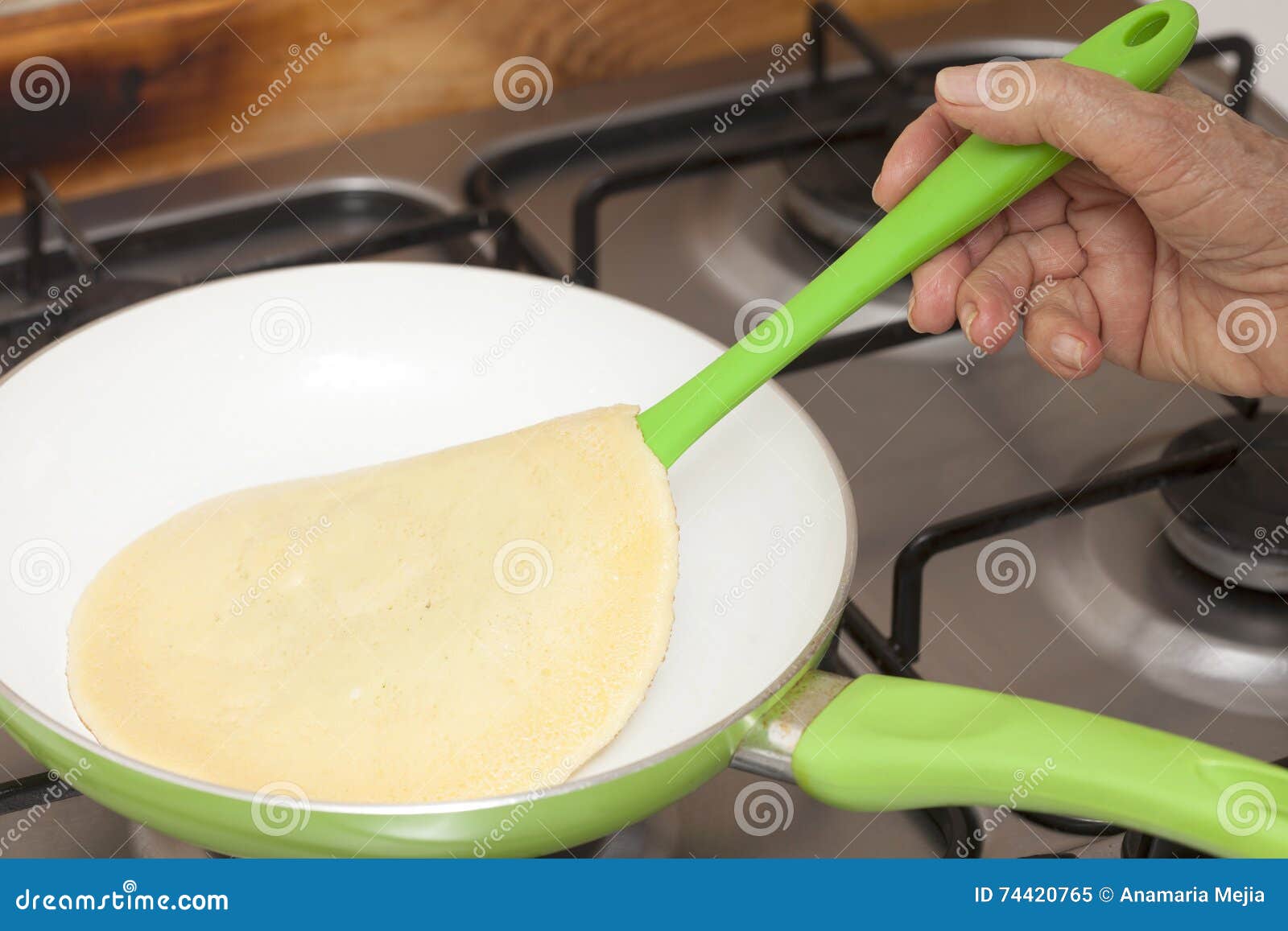 Cooking Dough Crepes on a Pan Stock Image - Image of crepes, stove ...