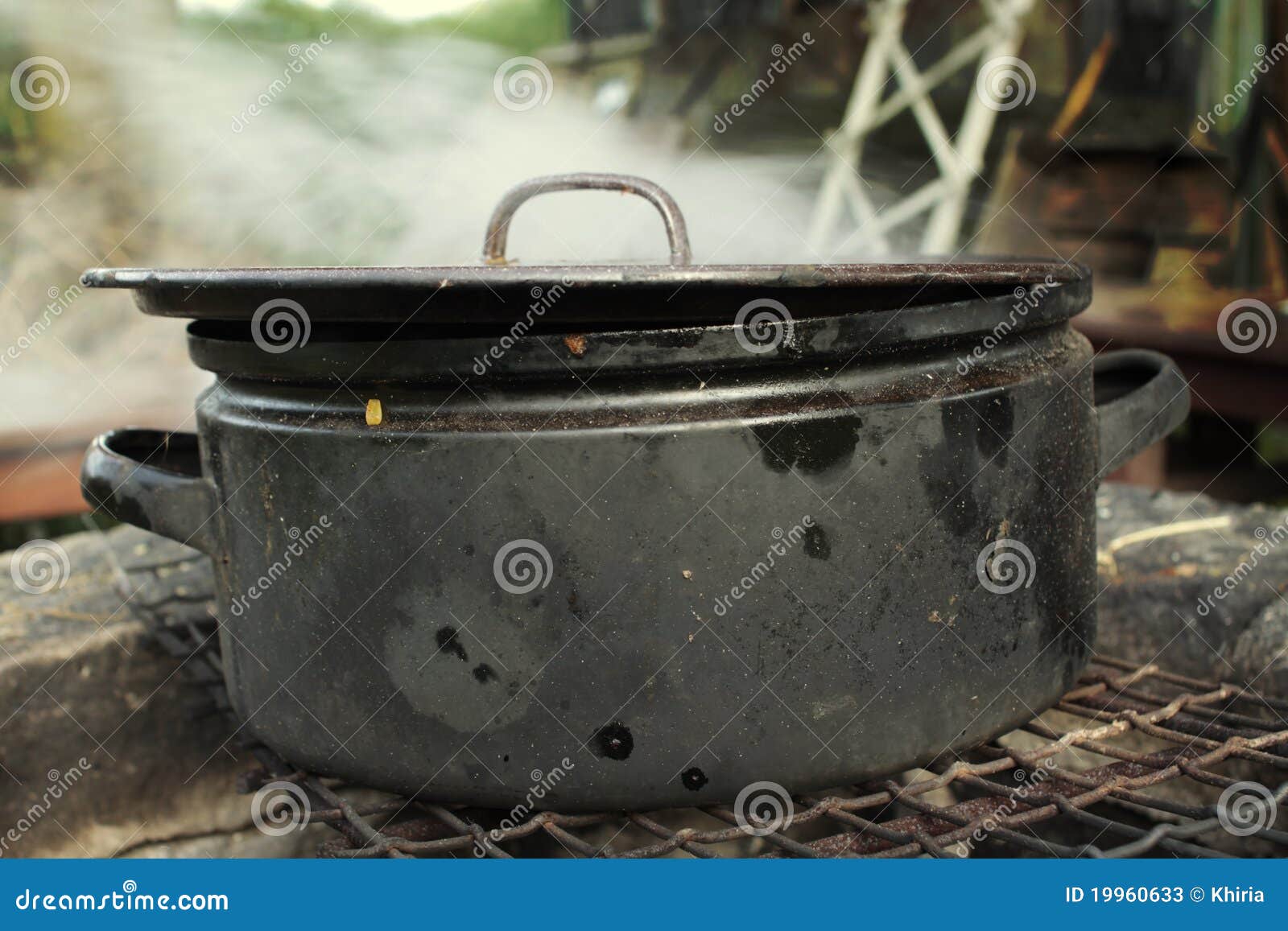 Cooking on fire stock image. Image of boiling, steam - 19960633