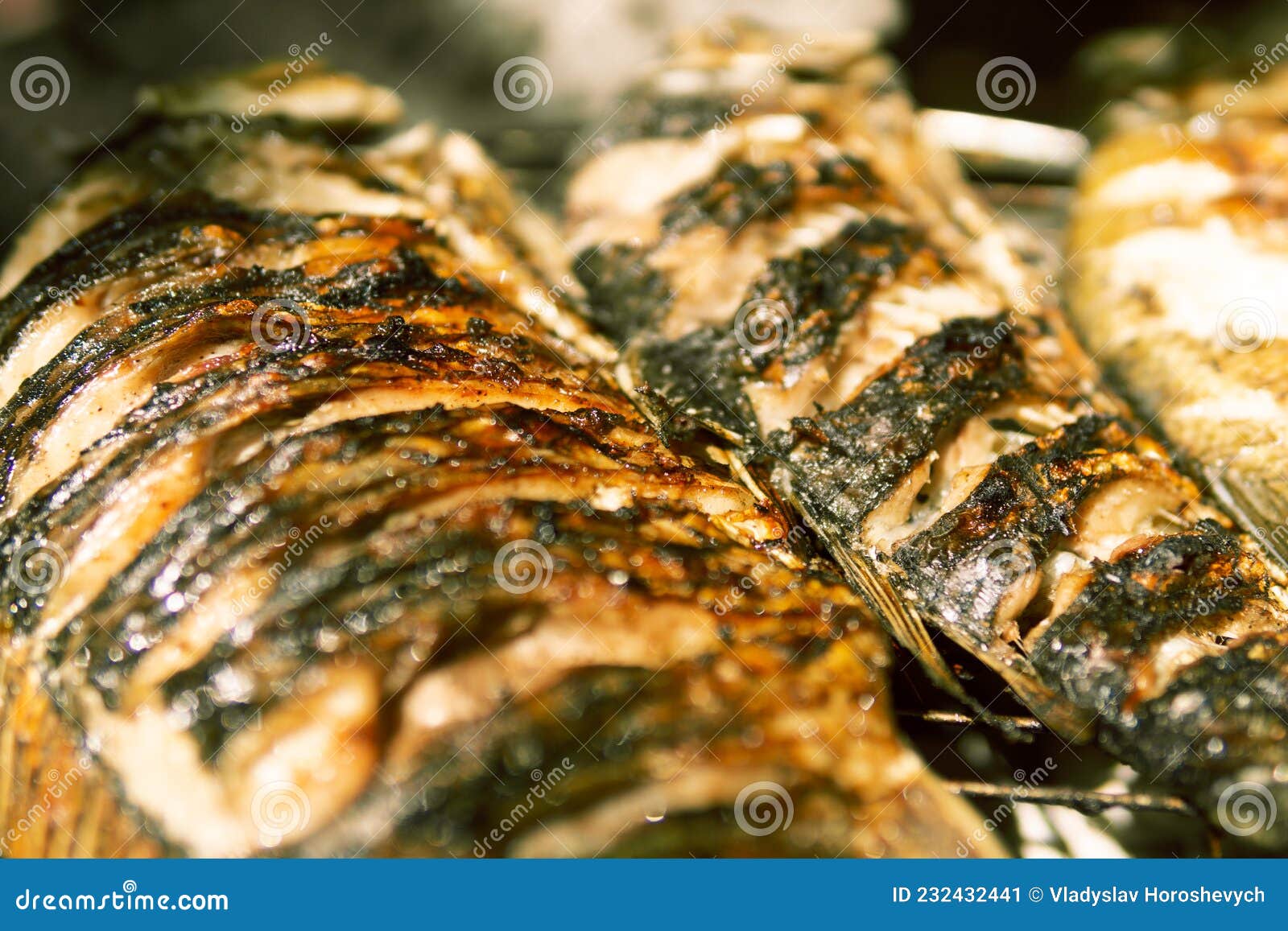 Cooking Fish on the Grill. Fried Fish. Fried Fish on the Fire. Close-up ...