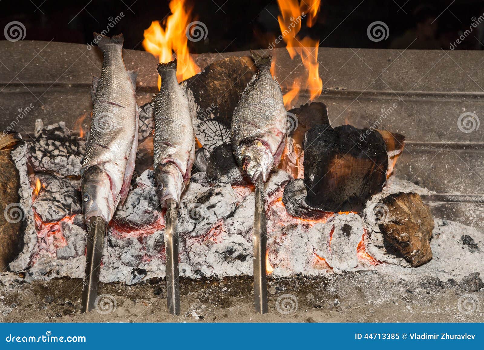 Cooking fish grilled stock image. Image of cooking, grille - 44713385