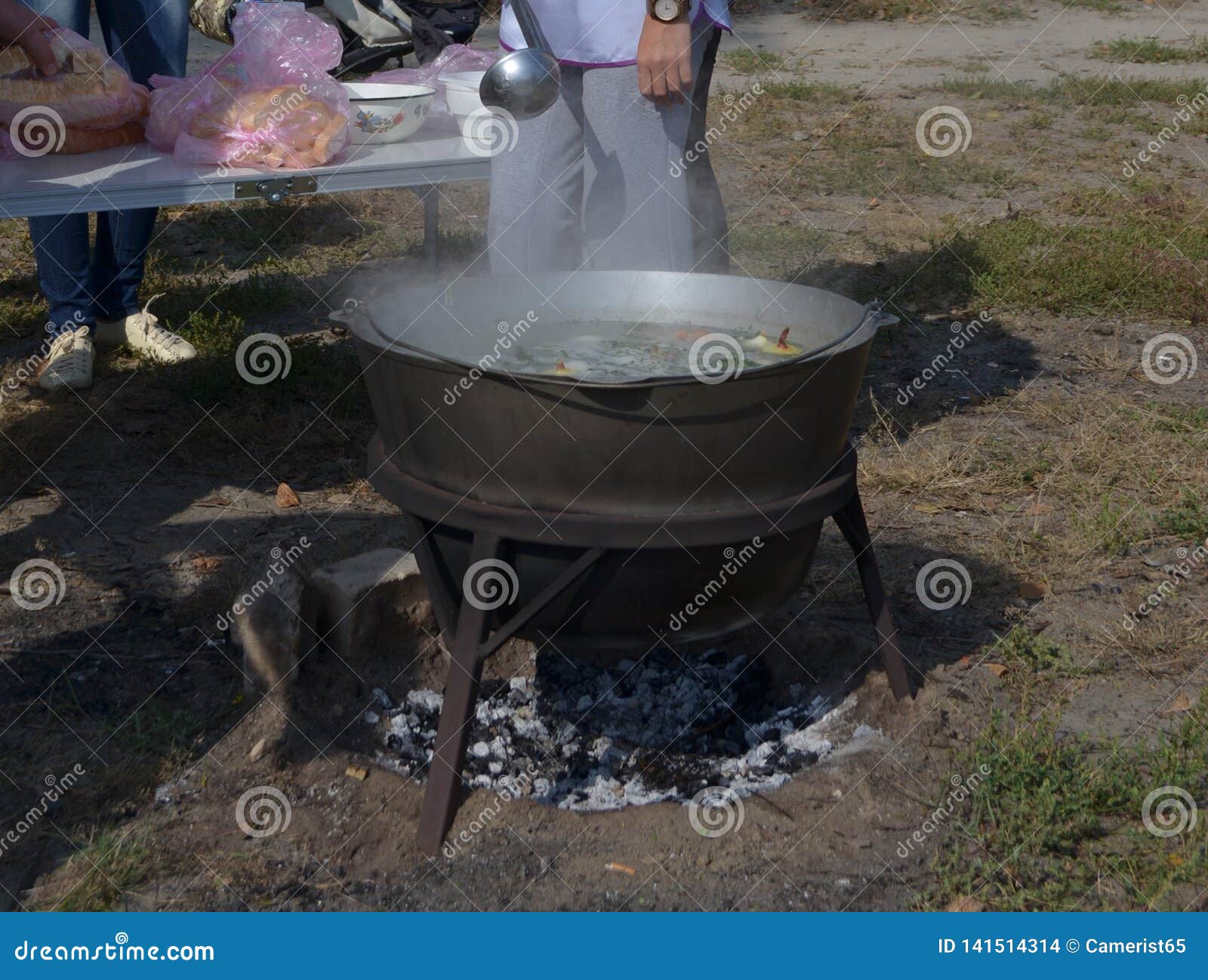 Cooking fish seen people stock photo. Image of fresh - 141514314