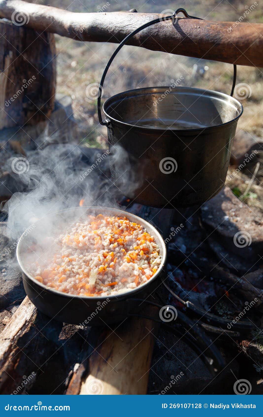 Cooking Food on Fire in a Pan and Cauldron Stock Photo - Image of ...