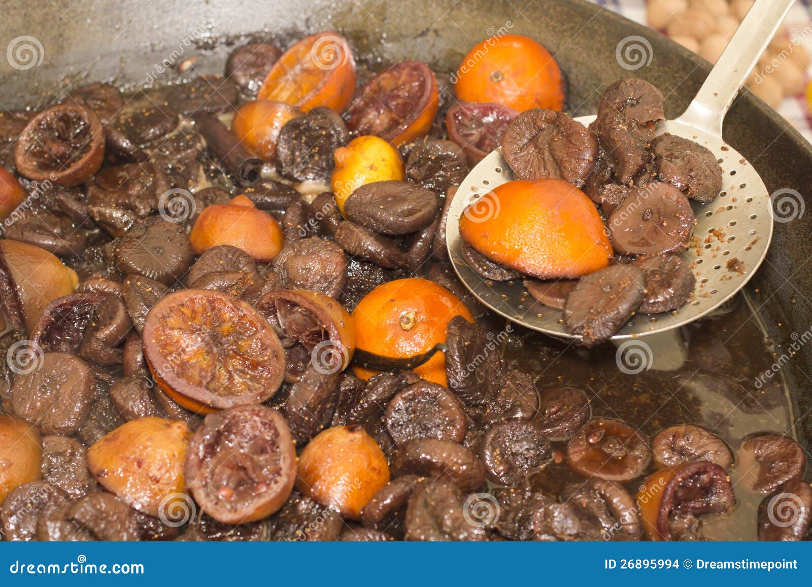 Cooking Fresh Green Figs in Red Wine Stock Photo - Image of ladle ...