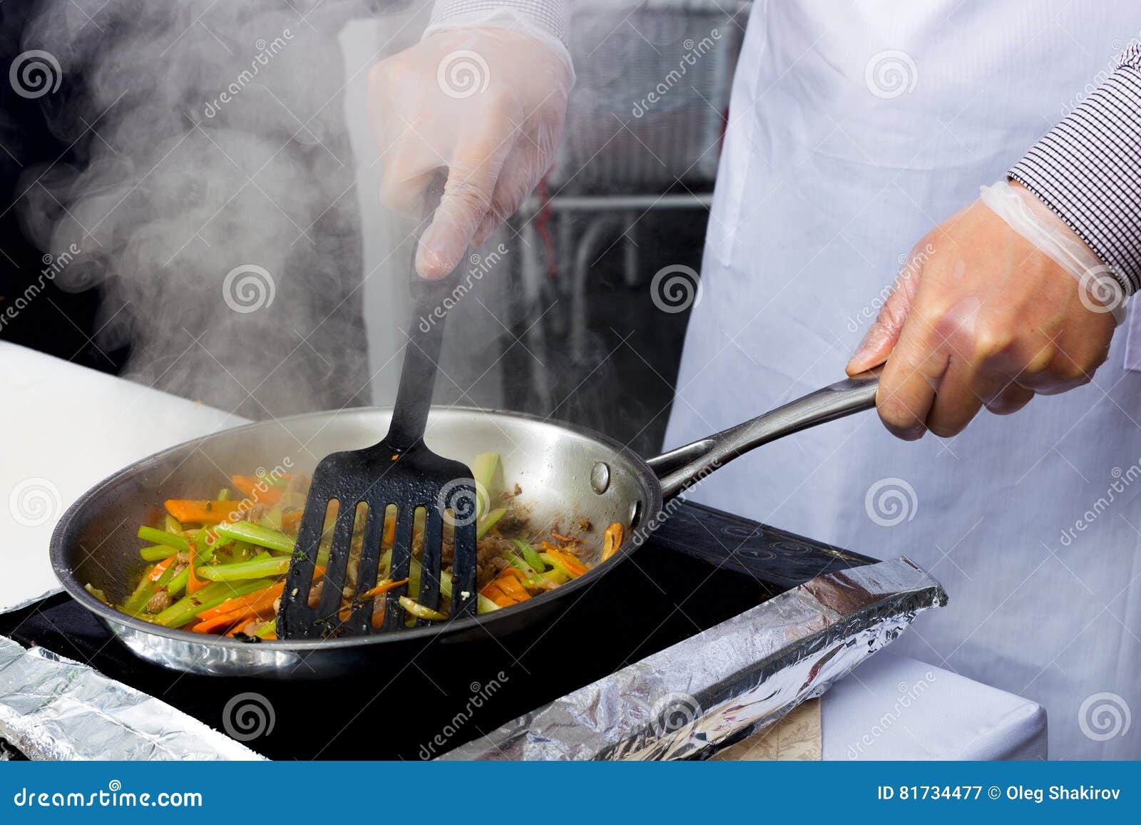 Cooking in a frying pan stock image. Image of shadow - 81734477