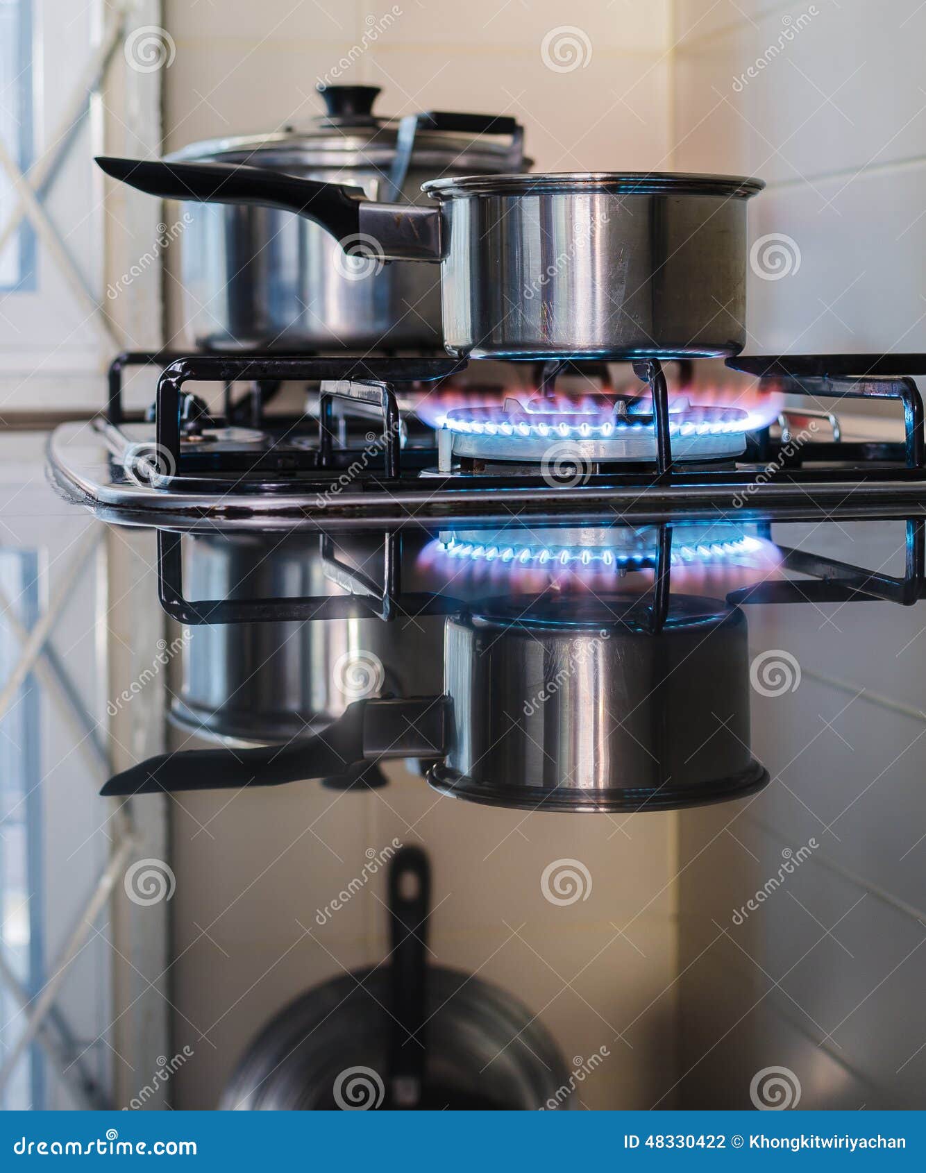 Cooking on a gas stove stock photo. Image of calor, contemporary - 48330422