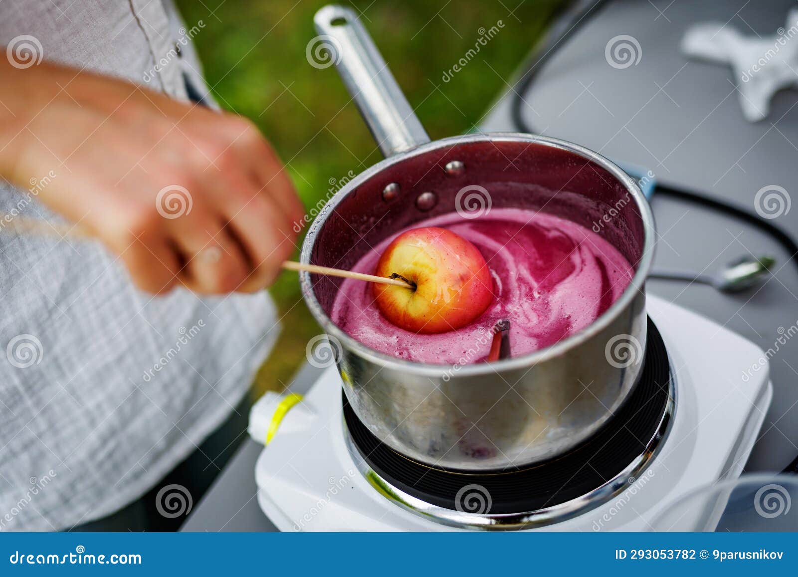 Cooking Glazed Apples in an Iron Pot Stock Photo - Image of caramel ...
