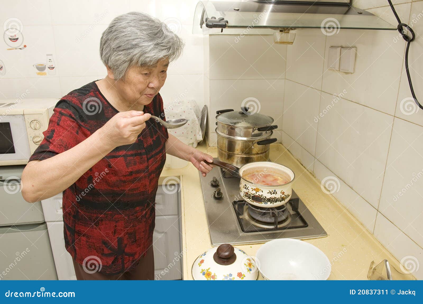 Cooking grandma stock image. Image of adult, cheerful - 20837311