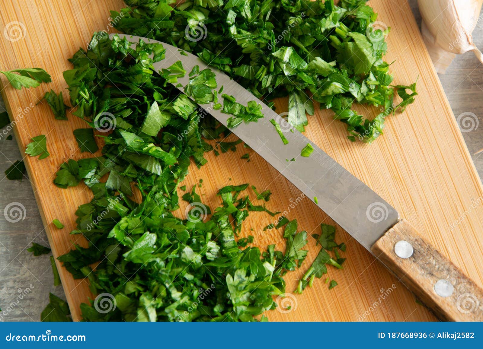 Cooking Greenery, Fresh Raw Parsley and Garlic on Kitchen Table Stock Photo - Image of food ...