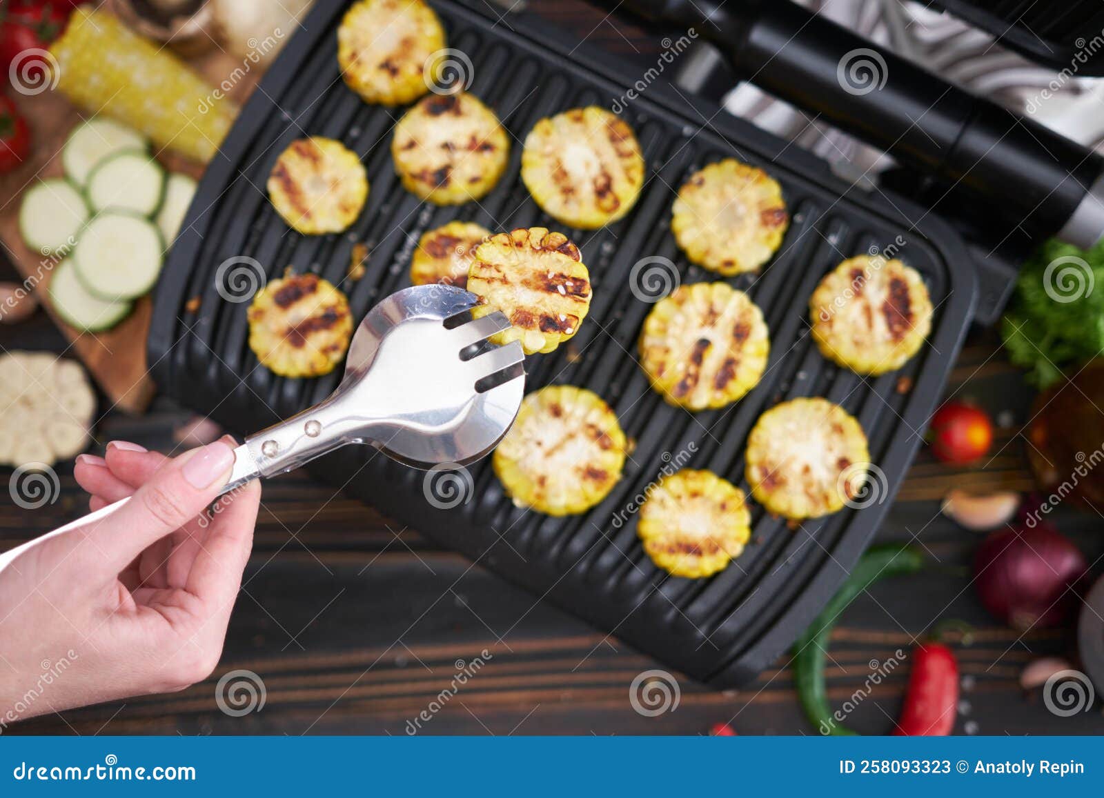 Cooking at Home on Electric Grill - Sliced Corn Cobs Stock Image ...