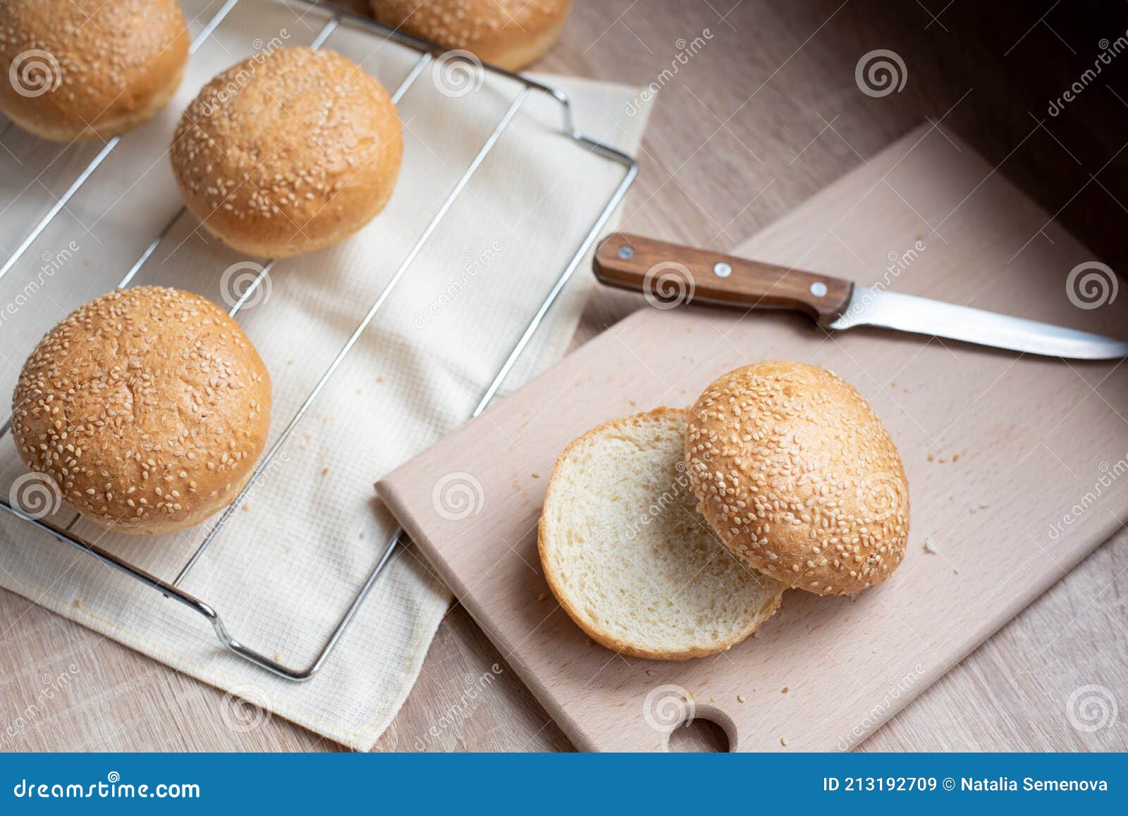 Cooking at Home, Sesame Hamburger Bun Cut in Half on a Board in the ...