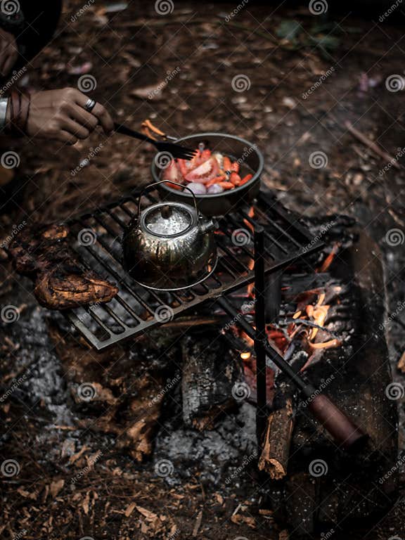 Cooking at the jungle stock image. Image of firecamp - 277425611