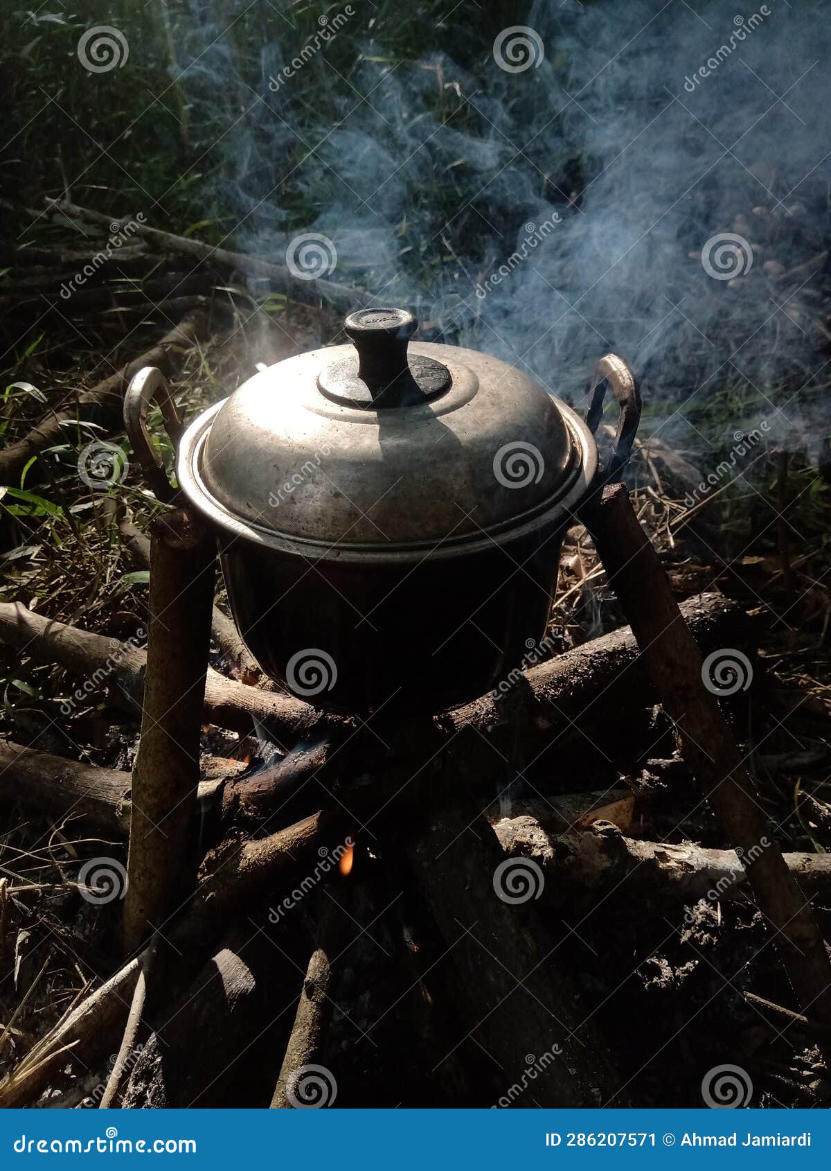 Cooking in the Jungle the Traditional Way. Stock Image - Image of ...