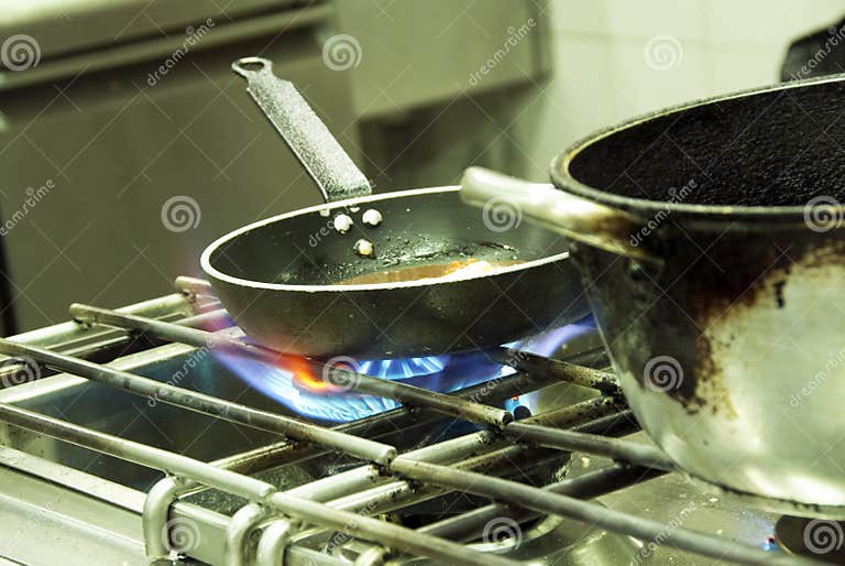 Cooking in a kitchen stock photo. Image of making, food - 10615954