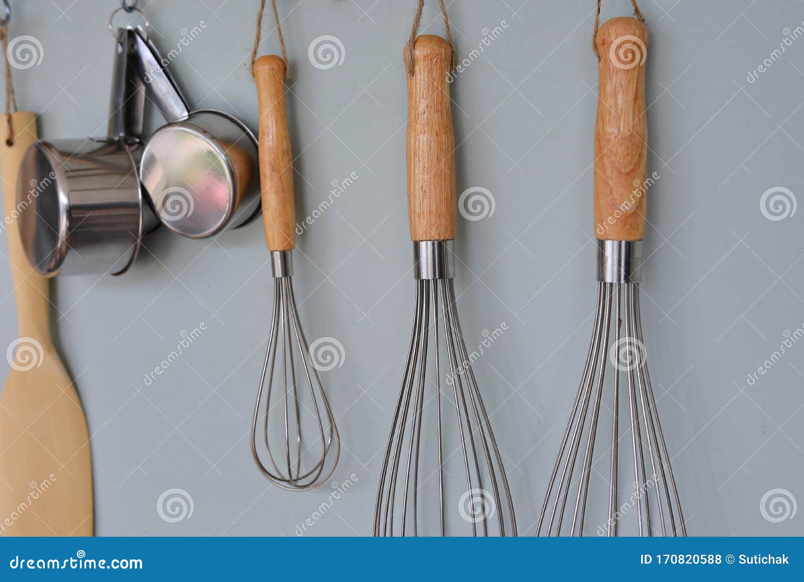 Cooking Kitchenware Hanging on Wall in Kitchen Room Stock Photo - Image ...