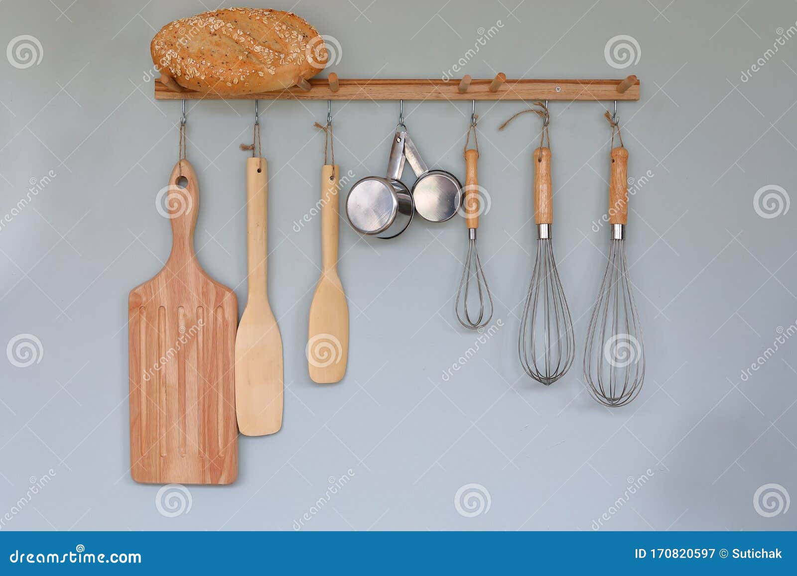 Cooking Kitchenware Hanging on Wall in Kitchen Room Stock Image - Image ...