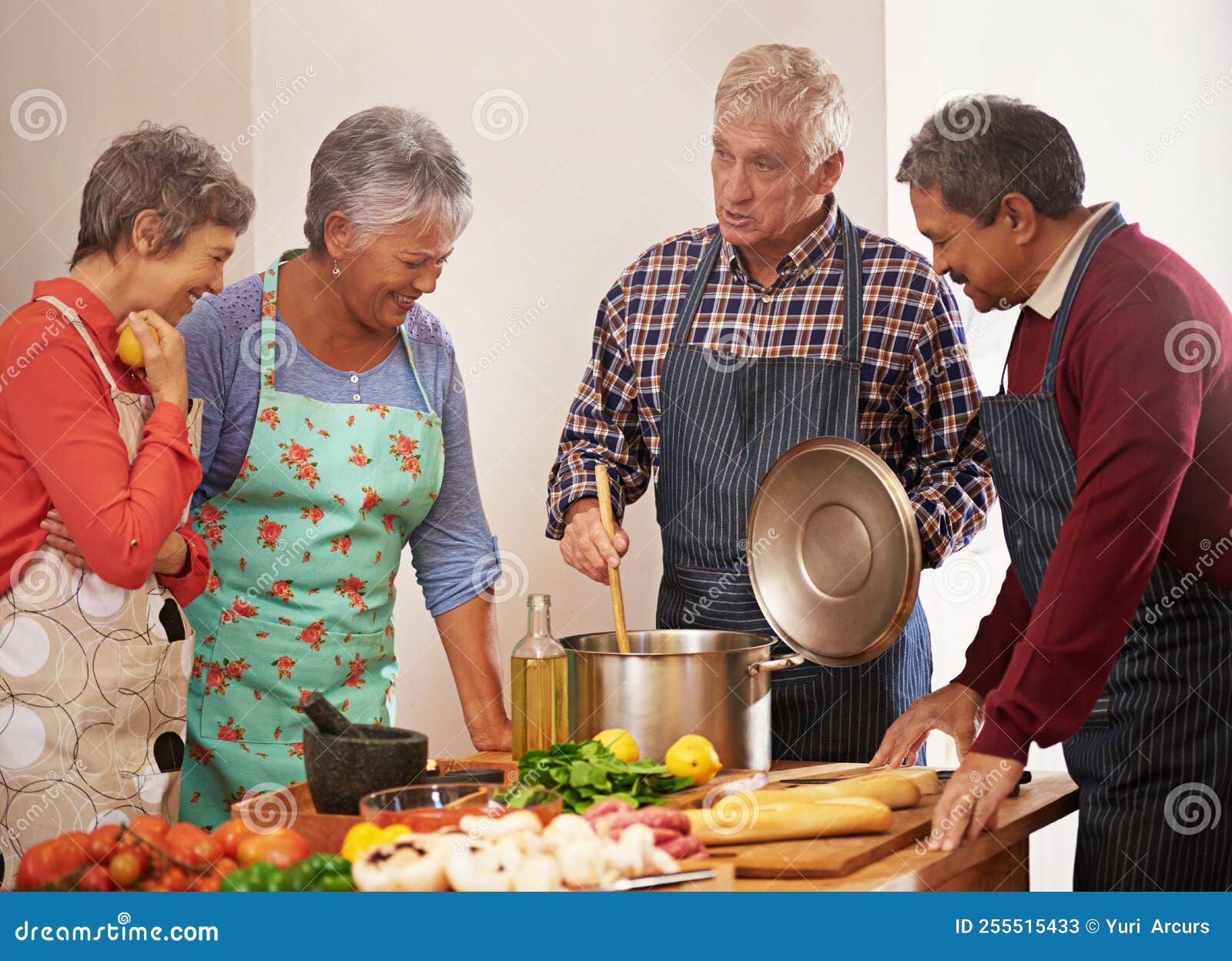 Cooking is Love Made Visible. a Group of Seniors Cooking in the Kitchen ...