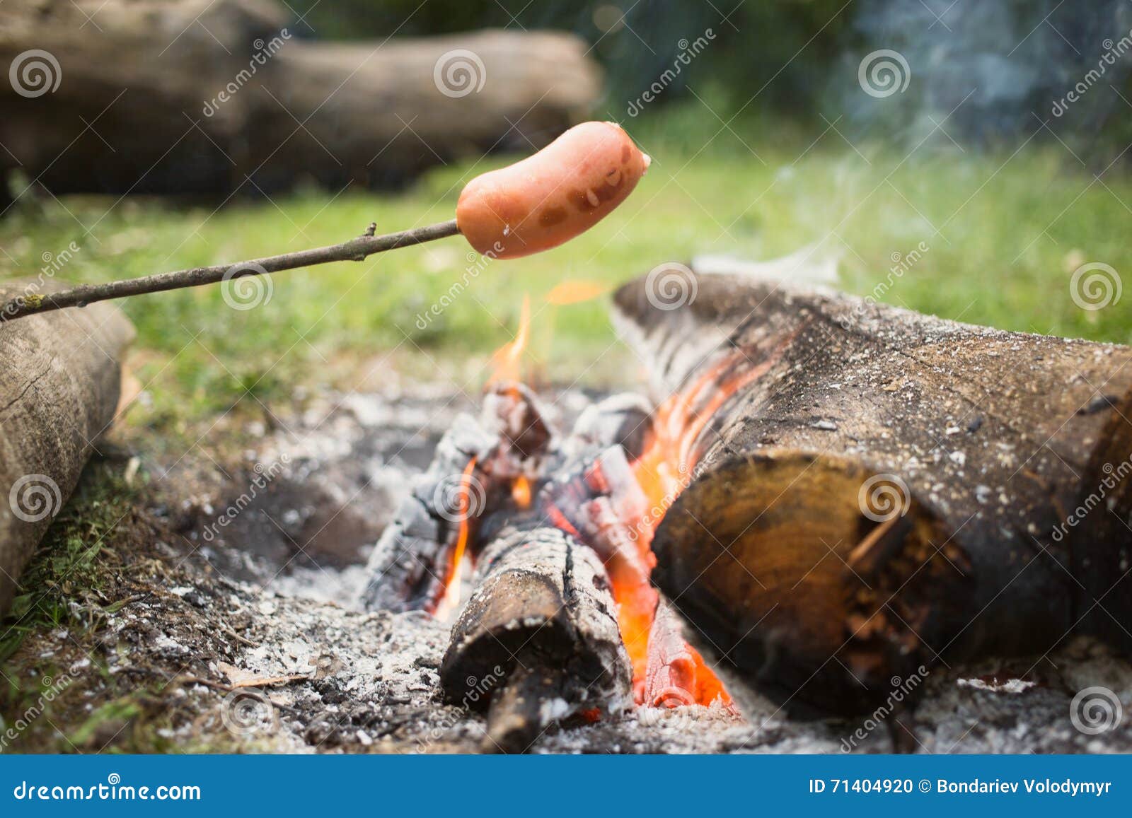 Cooking a Meal Over an Open Fire. Stock Photo - Image of landscape ...