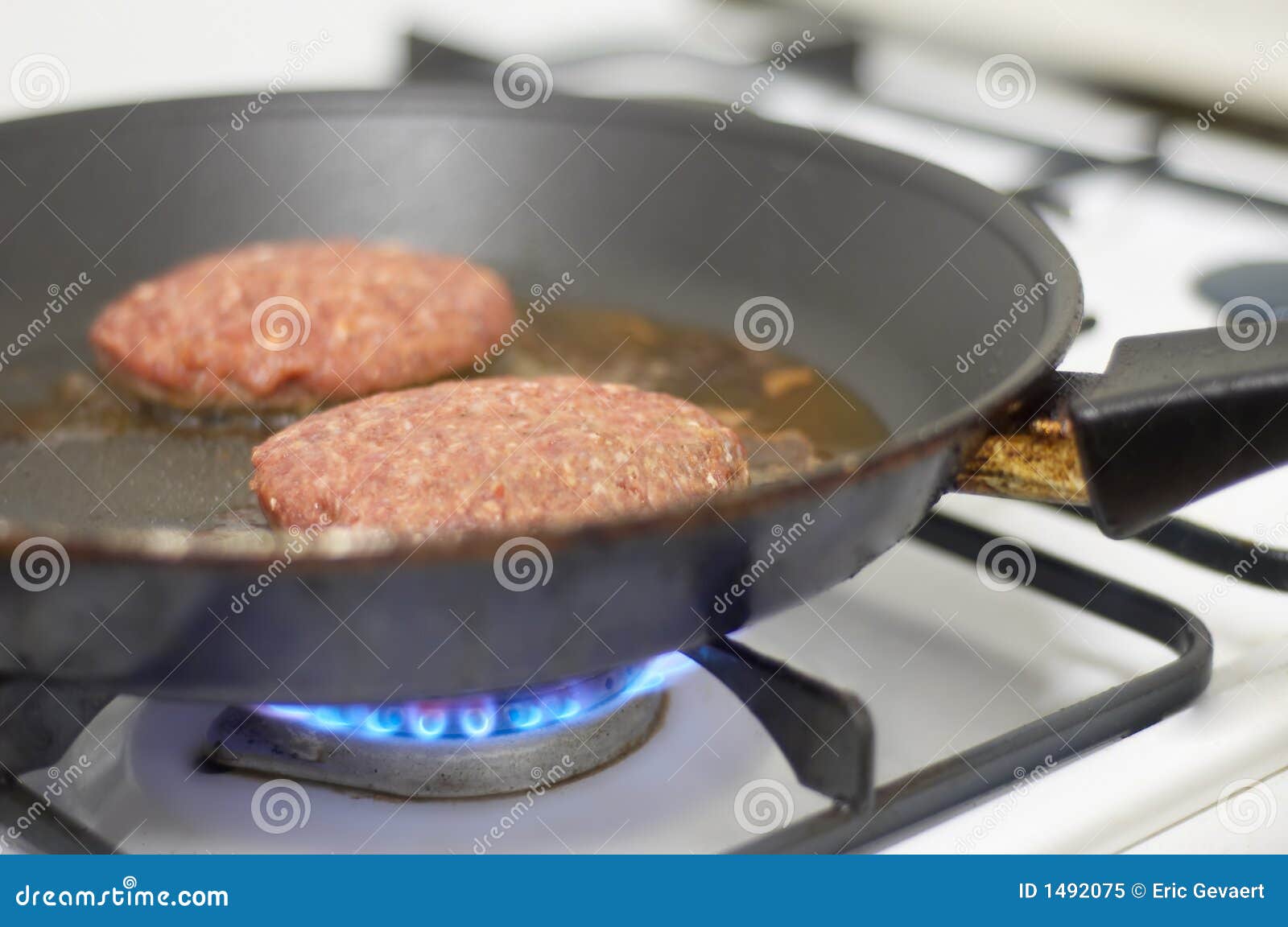 Cooking meat stock image. Image of flame, burner, kitchen - 1492075